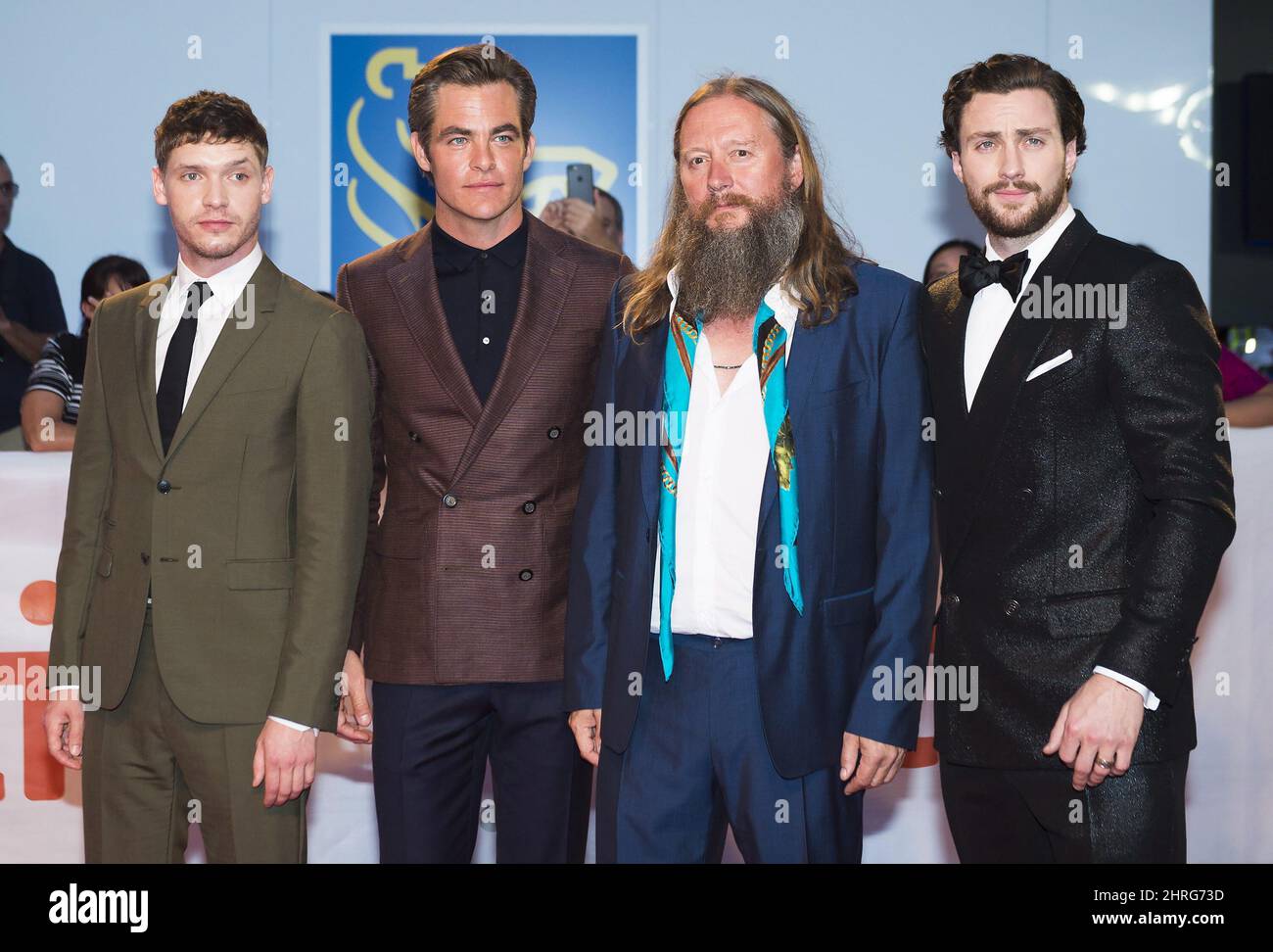 Actors Billy Howle, left, Chris Pine, second left, director David ...