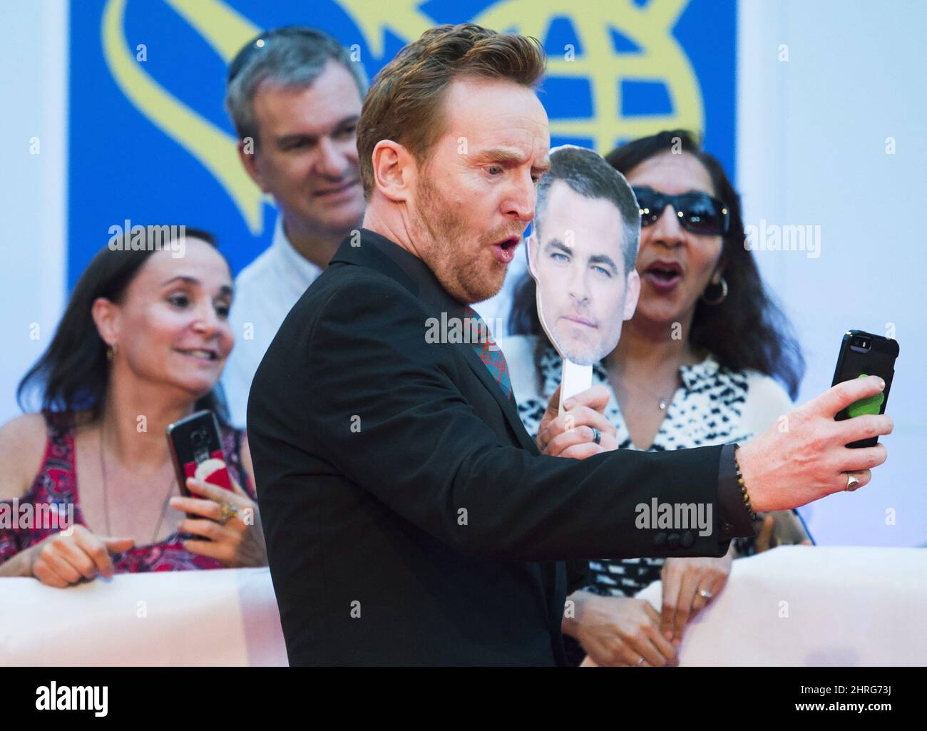 Actor Tony Curran poses for photographs on the red carpet after ...