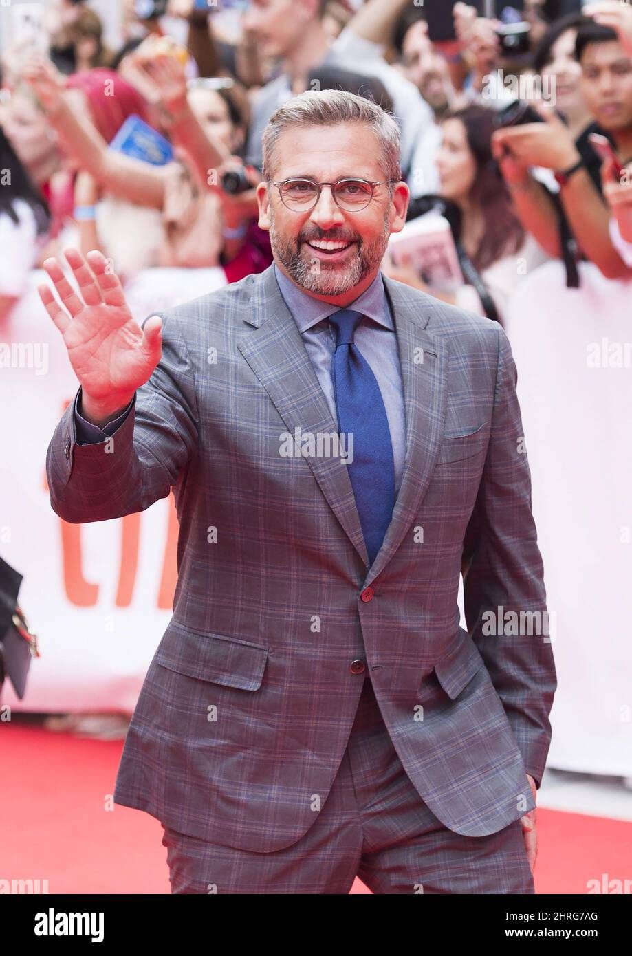 Actor Steve Carell poses for photographs on the red carpet after ...