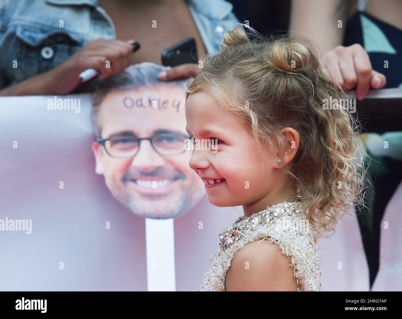 Actress Oakley Bull signs her autograph and poses for photographs on ...