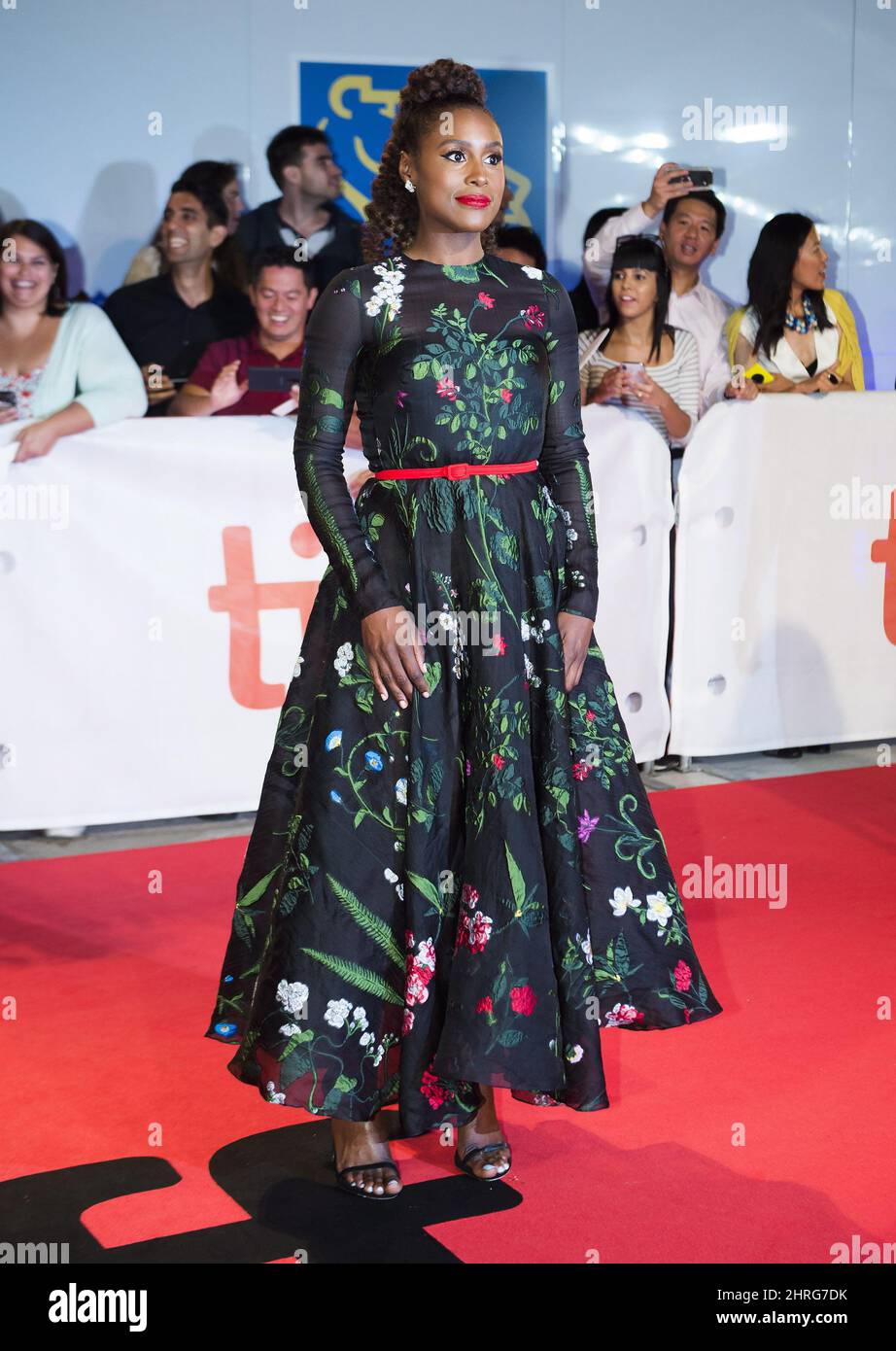 Actress Issa Rae poses for photographs on the red carpet after arriving ...