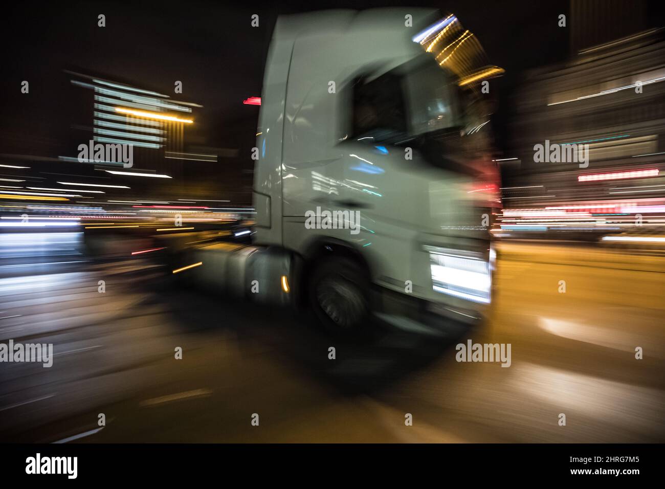 Truck on a blurred background shot in time lapse Stock Photo - Alamy