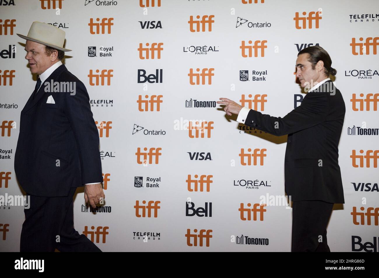 Actors John C. Reilly and Joaquin Phoenix arrive ahead of the screening ...