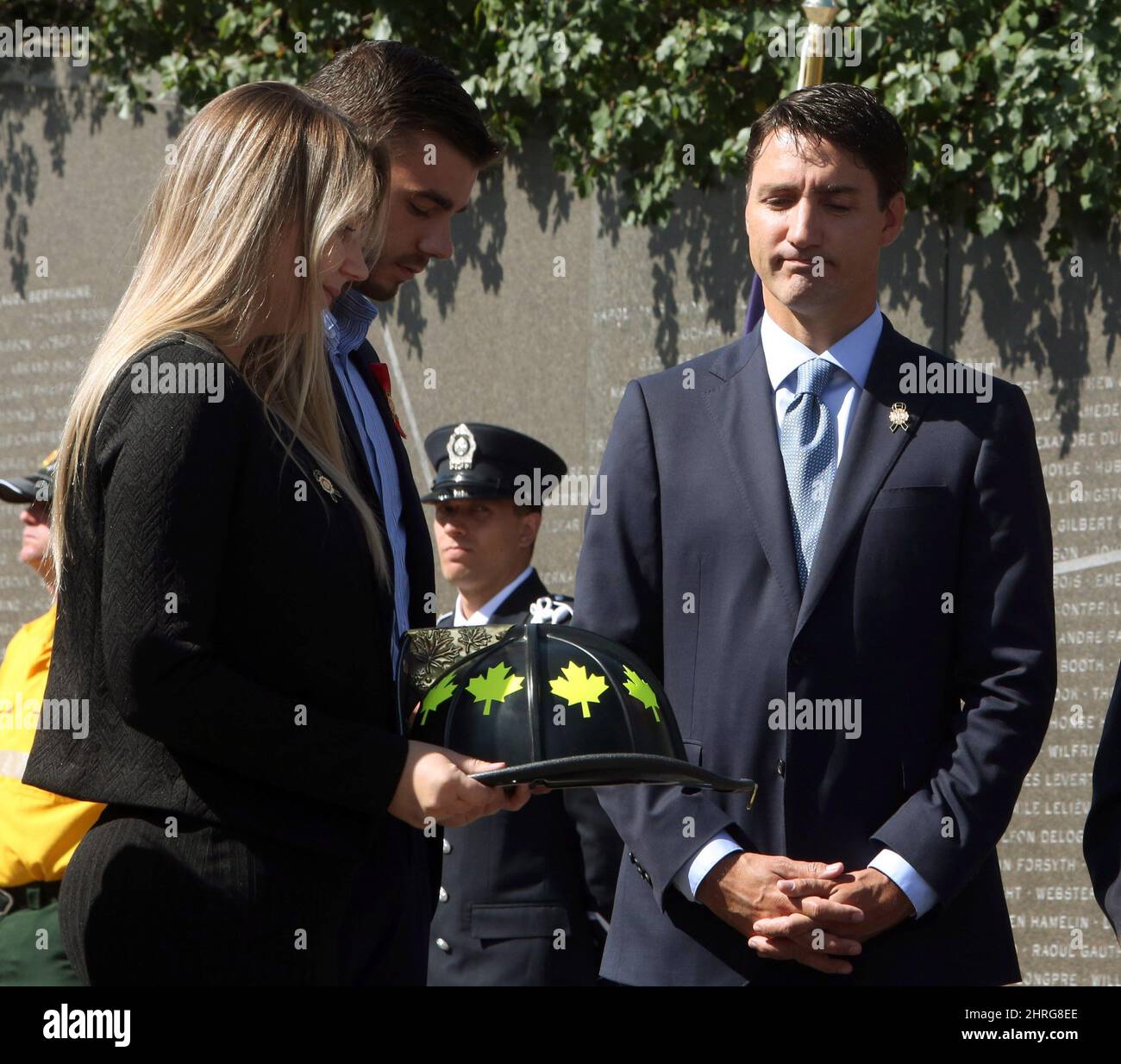 Prime Minister Justin Trudeau (right)looks on as Samuel and Noemie ...
