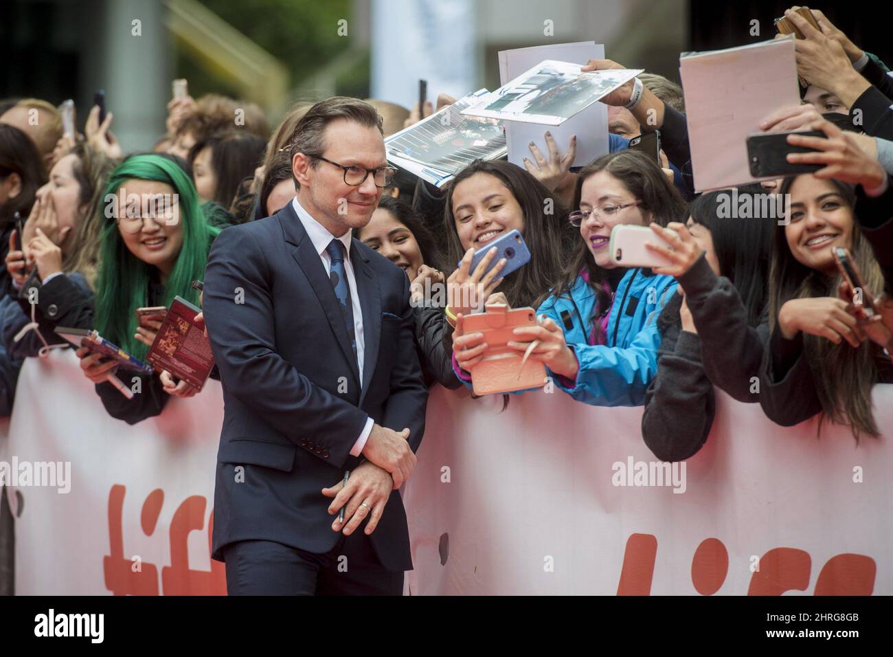 Actor Christian Slater takes photos with fans at red carpet for the ...
