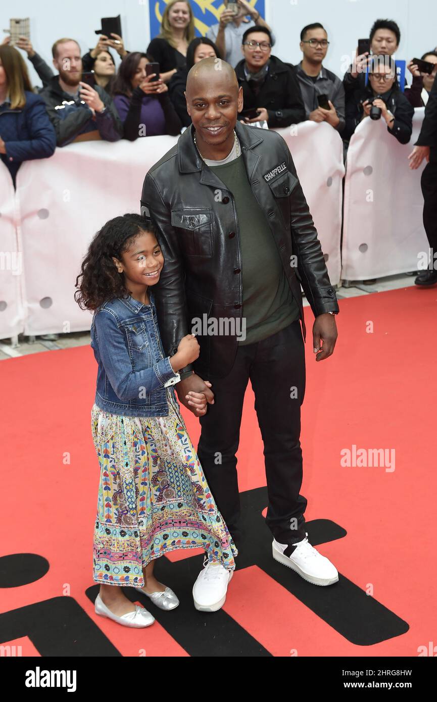 Actor Dave Chappelle and his daughter Sonal arrive on the red carpet ...