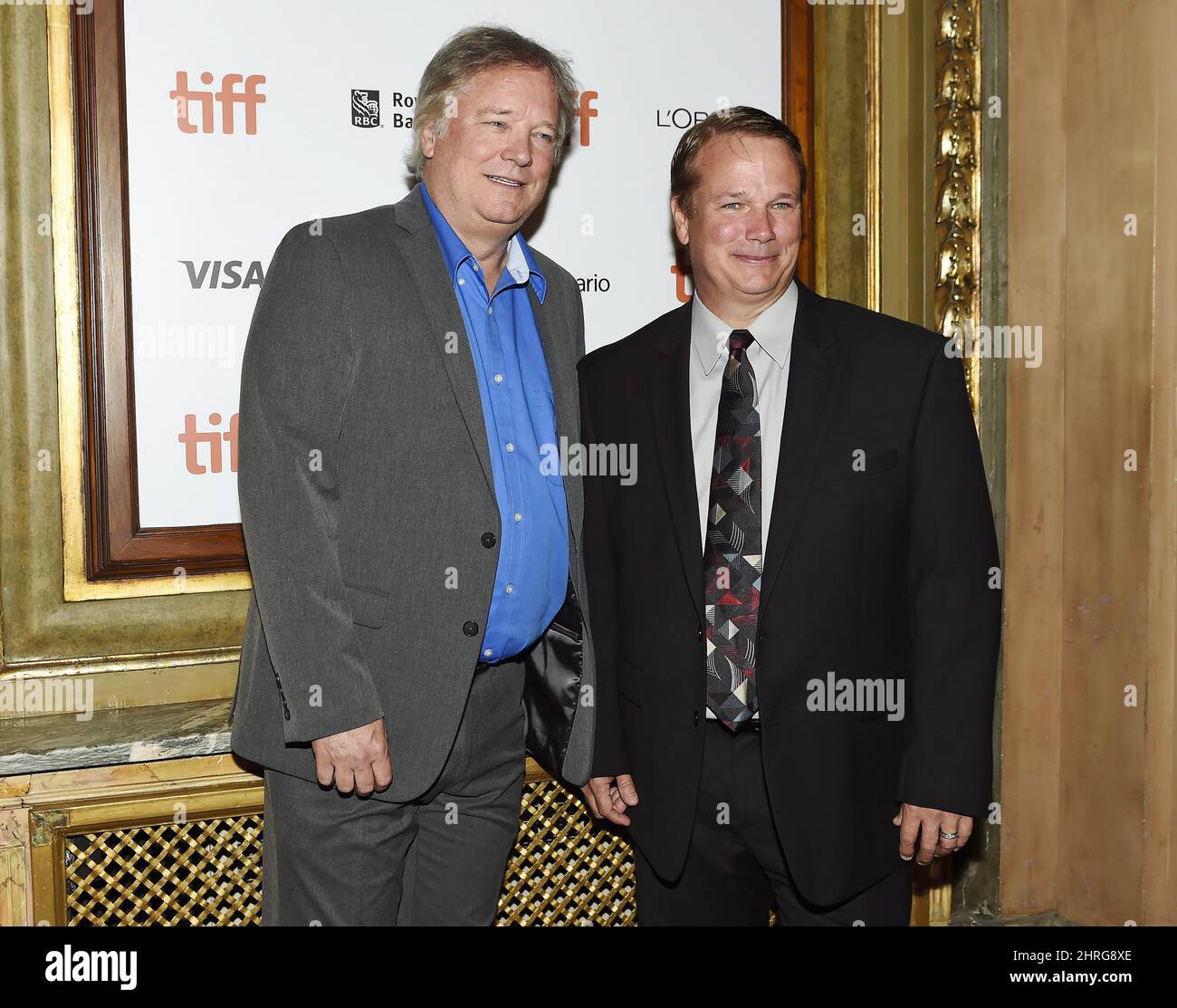 Neil Armstrong's sons Rick, left, and Mark pose for photographs on the ...