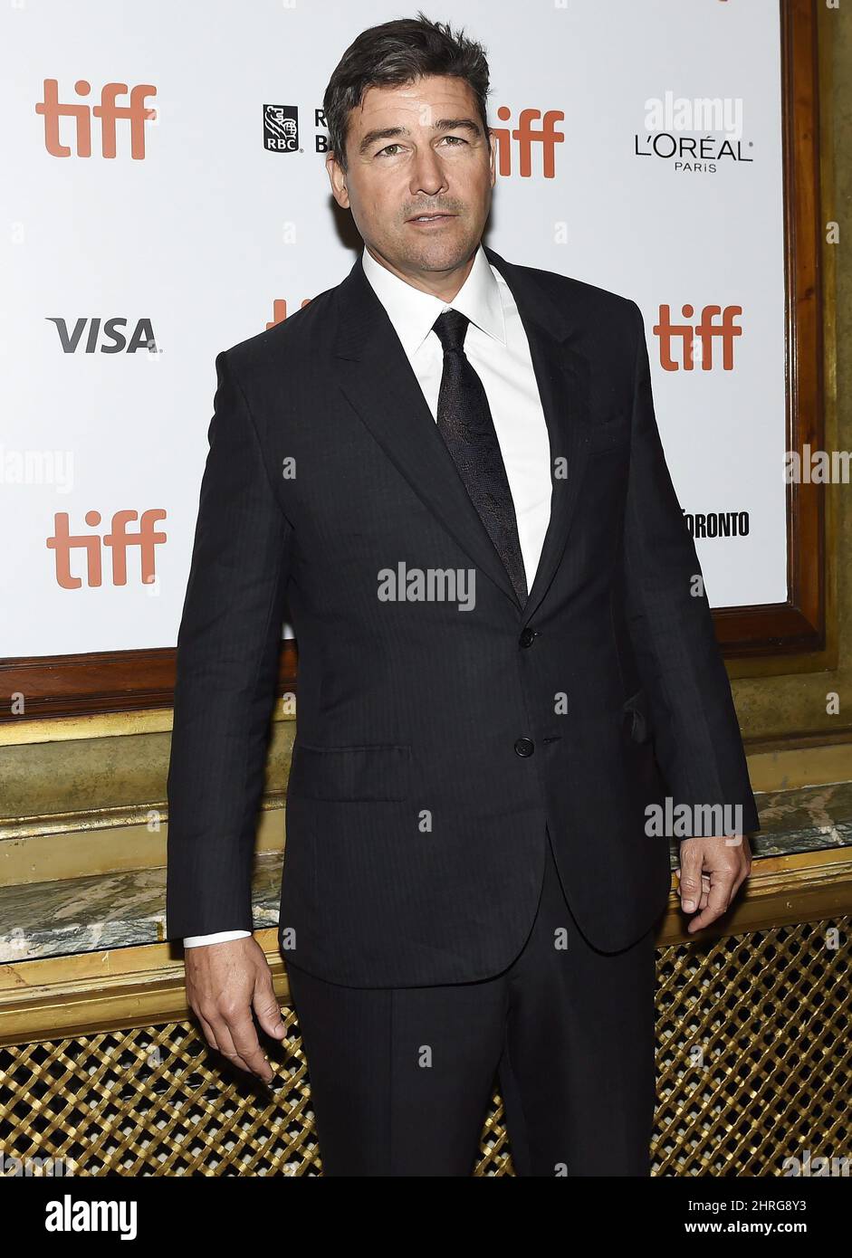 Actor Kyle Chandler poses for photographs on the red carpet after ...