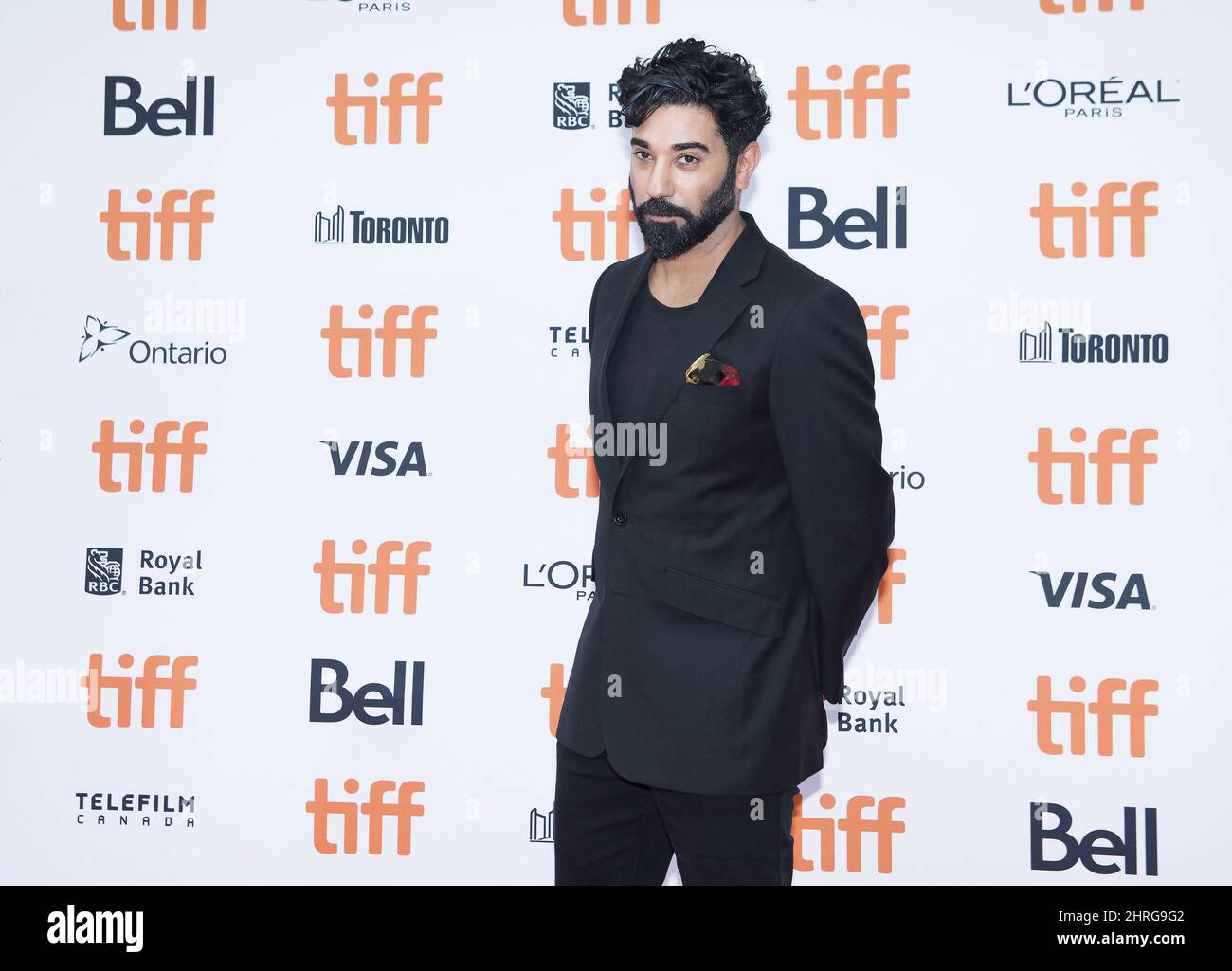 Actor Ray Panthaki poses for photographs on the red carpet after ...