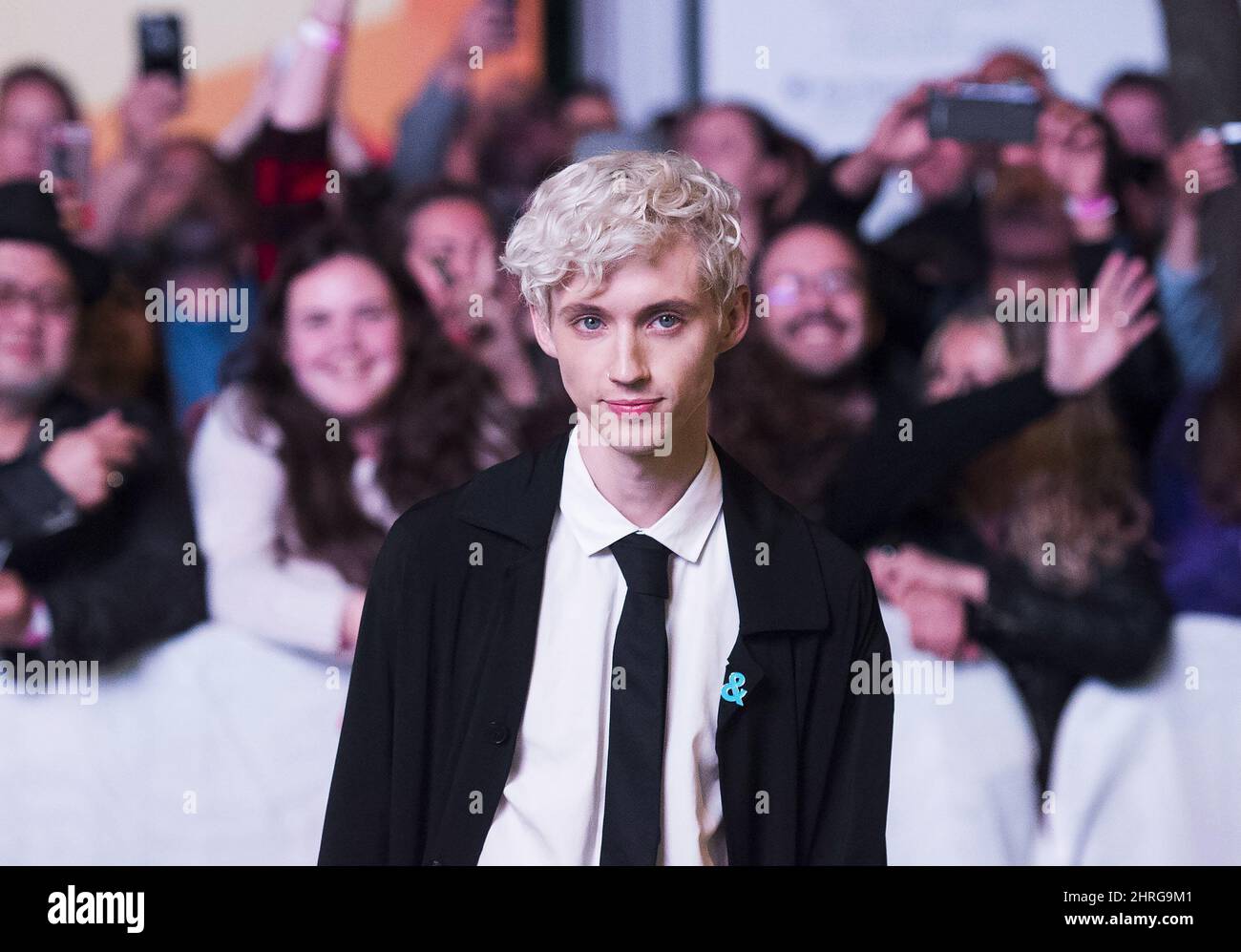 Signer and actor Troye Sivan poses for photographs on the red carpet ...