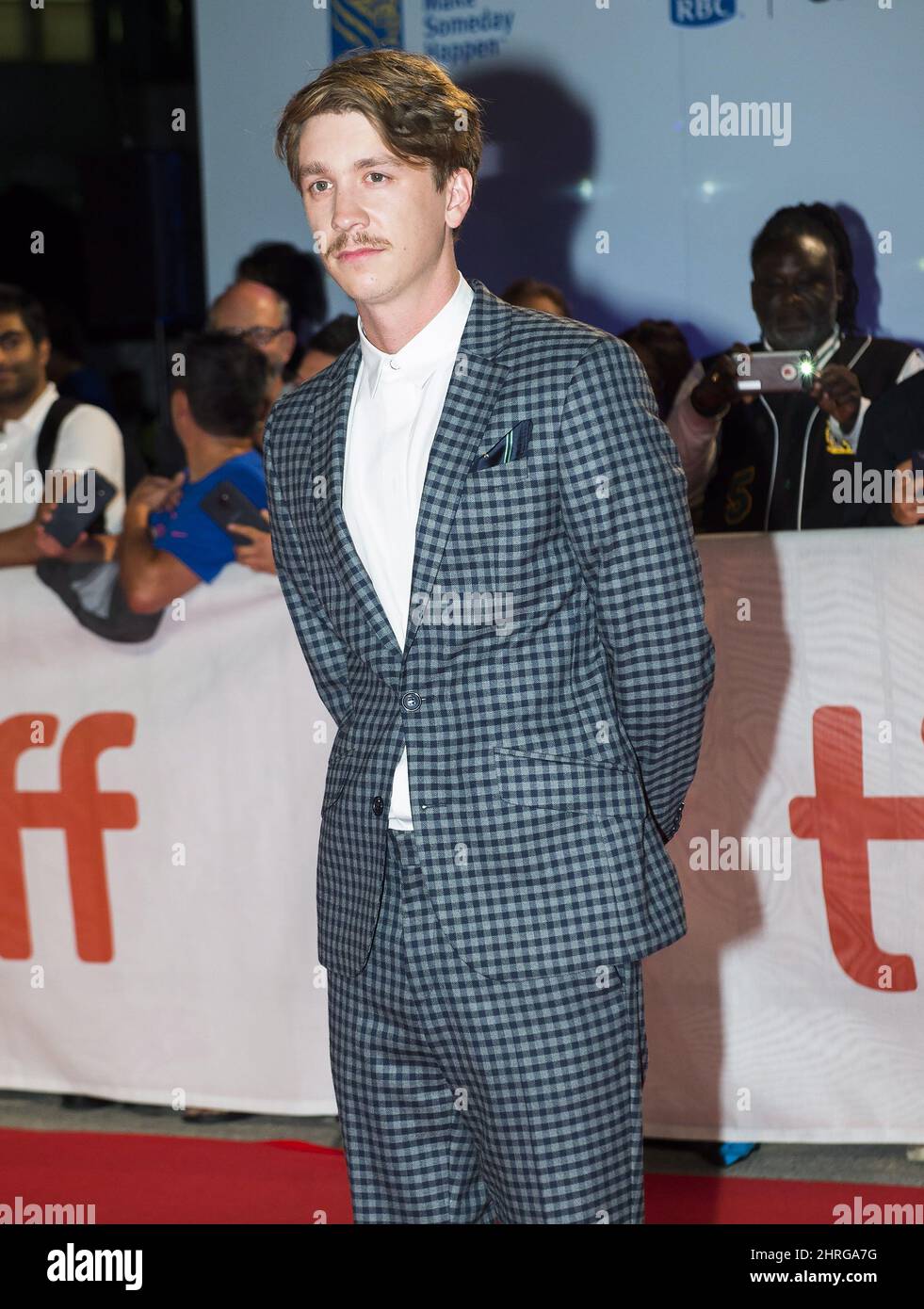 Actor Thomas Mann poses for photographs on the red carpet for the new ...