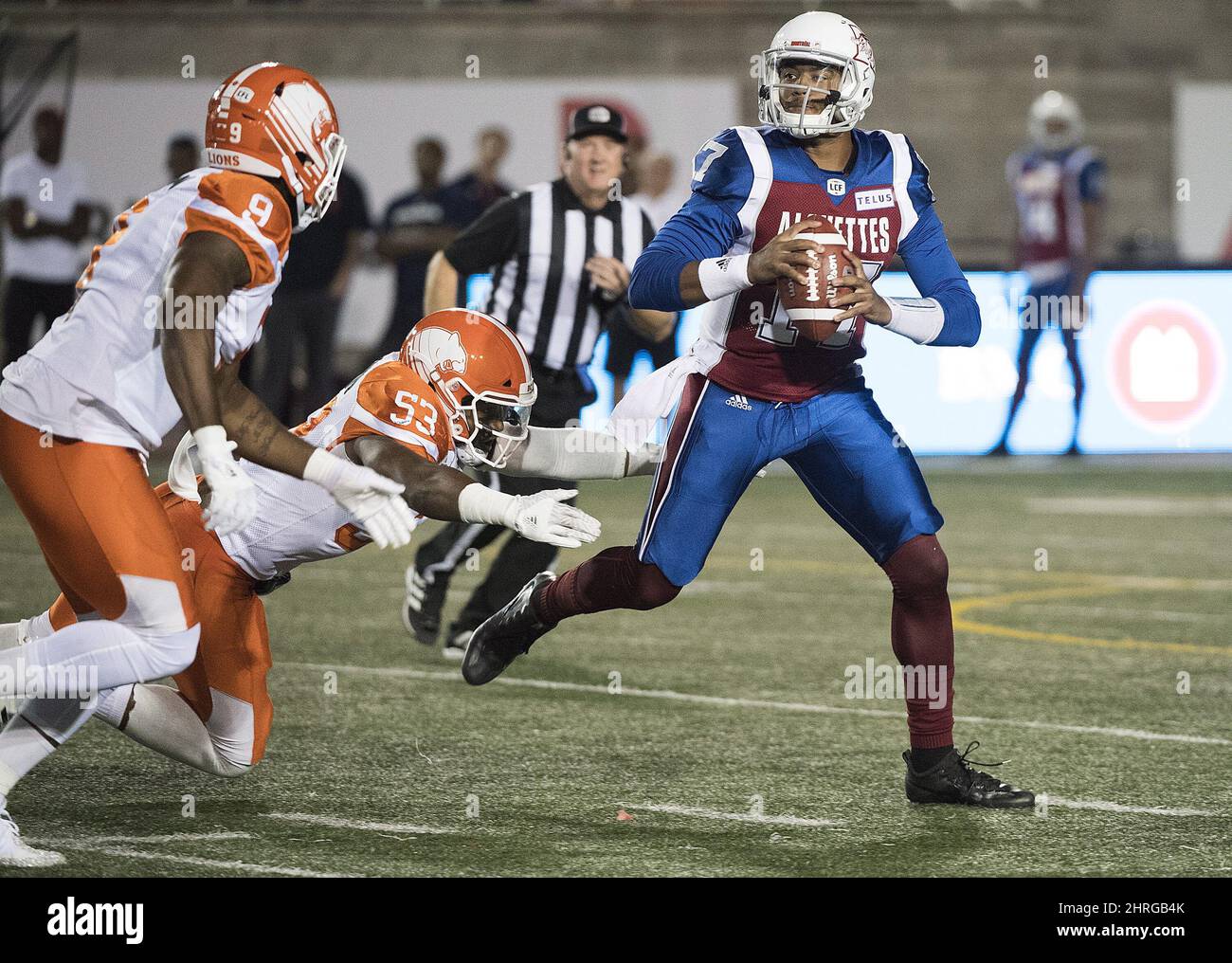 Montreal Alouettes quarterback Antonio Pipkin, right, breaks away from ...