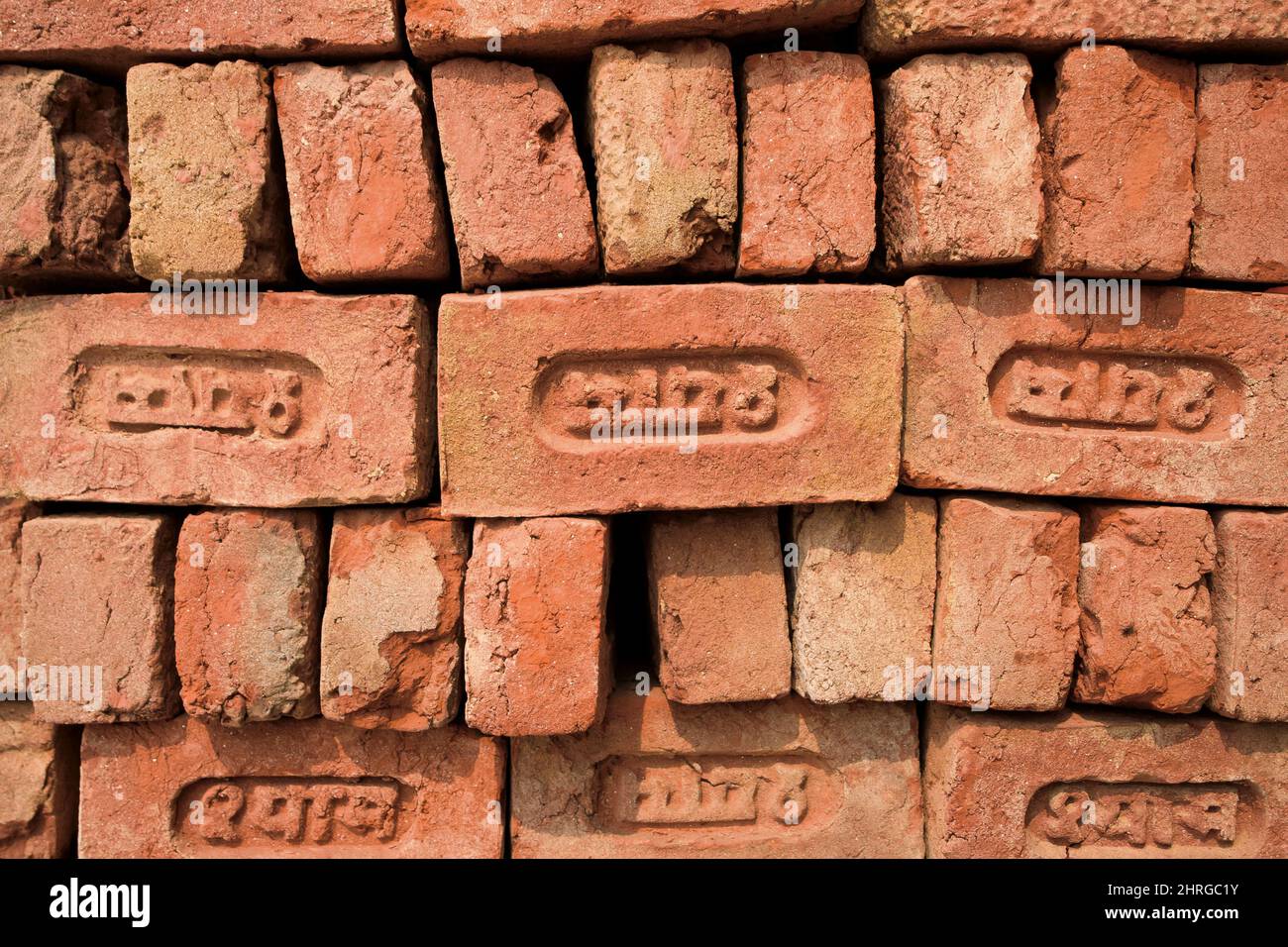 Closeup shot of red bricks with sanskrits on it in India Stock Photo ...