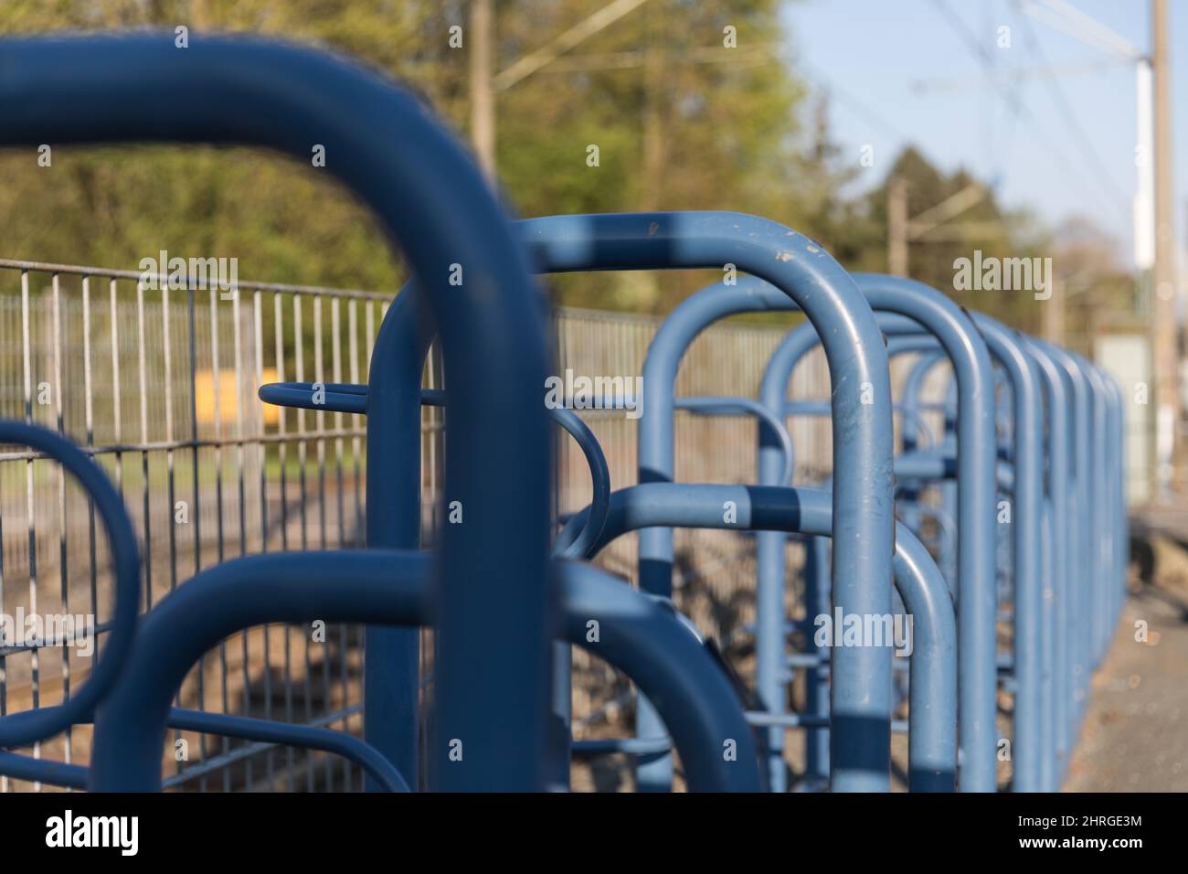 Closeup shot of the blue fence of a playground in a park Stock Photo ...