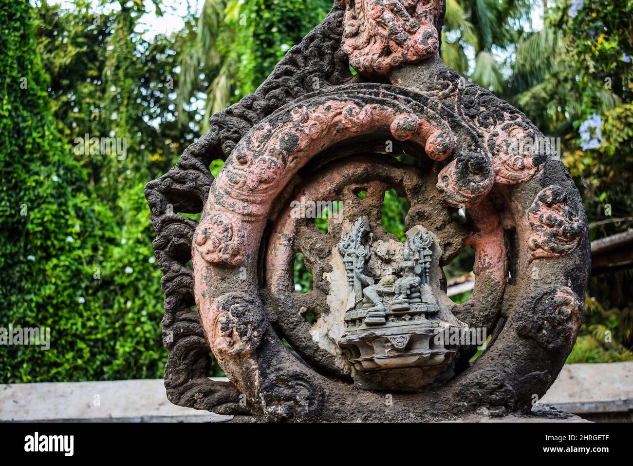 Ruined black stone carved round shape Sculpture depicting at Townhall ...