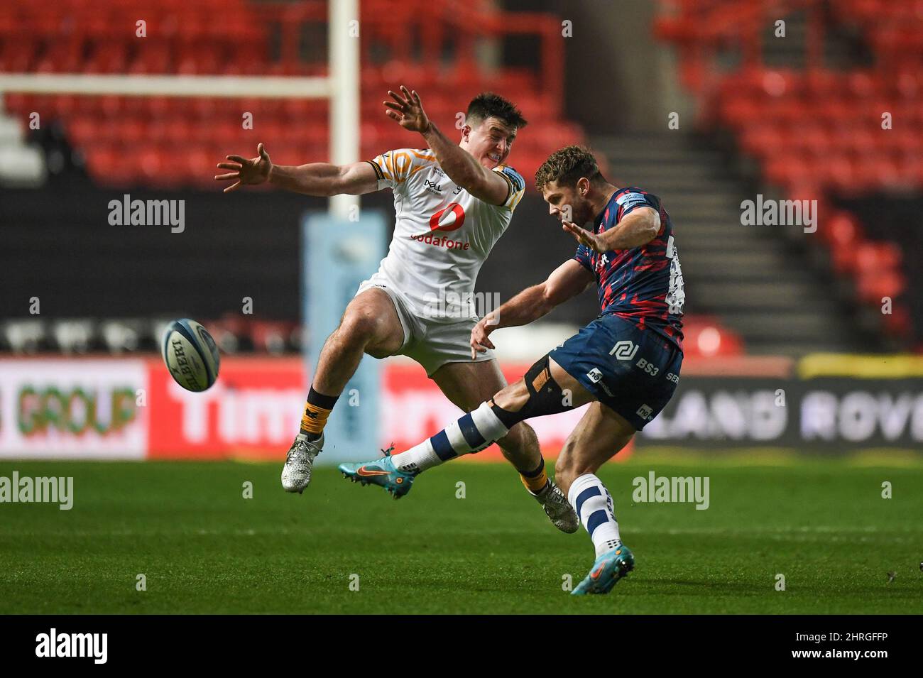 Henry Purdy of Bristol Bears, clears ball under pressure from Sam Spink ...