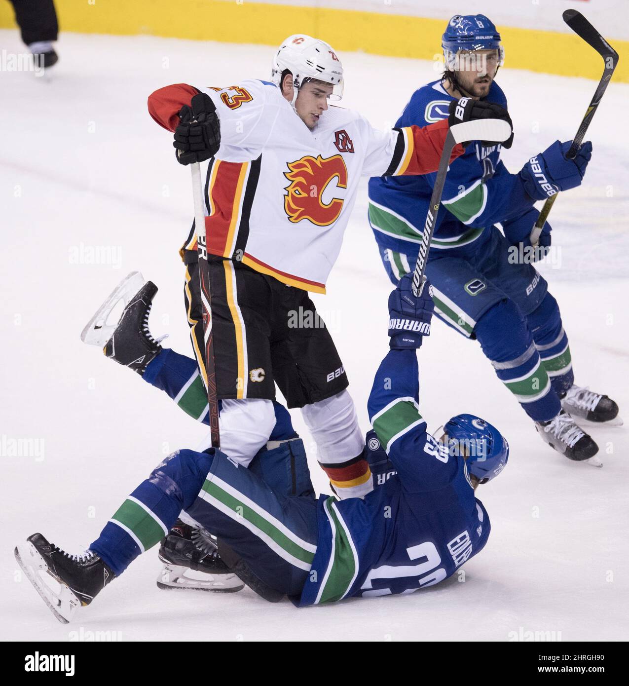 Vancouver Canucks defenseman Christopher Tanev (8) looks on as Calgary ...