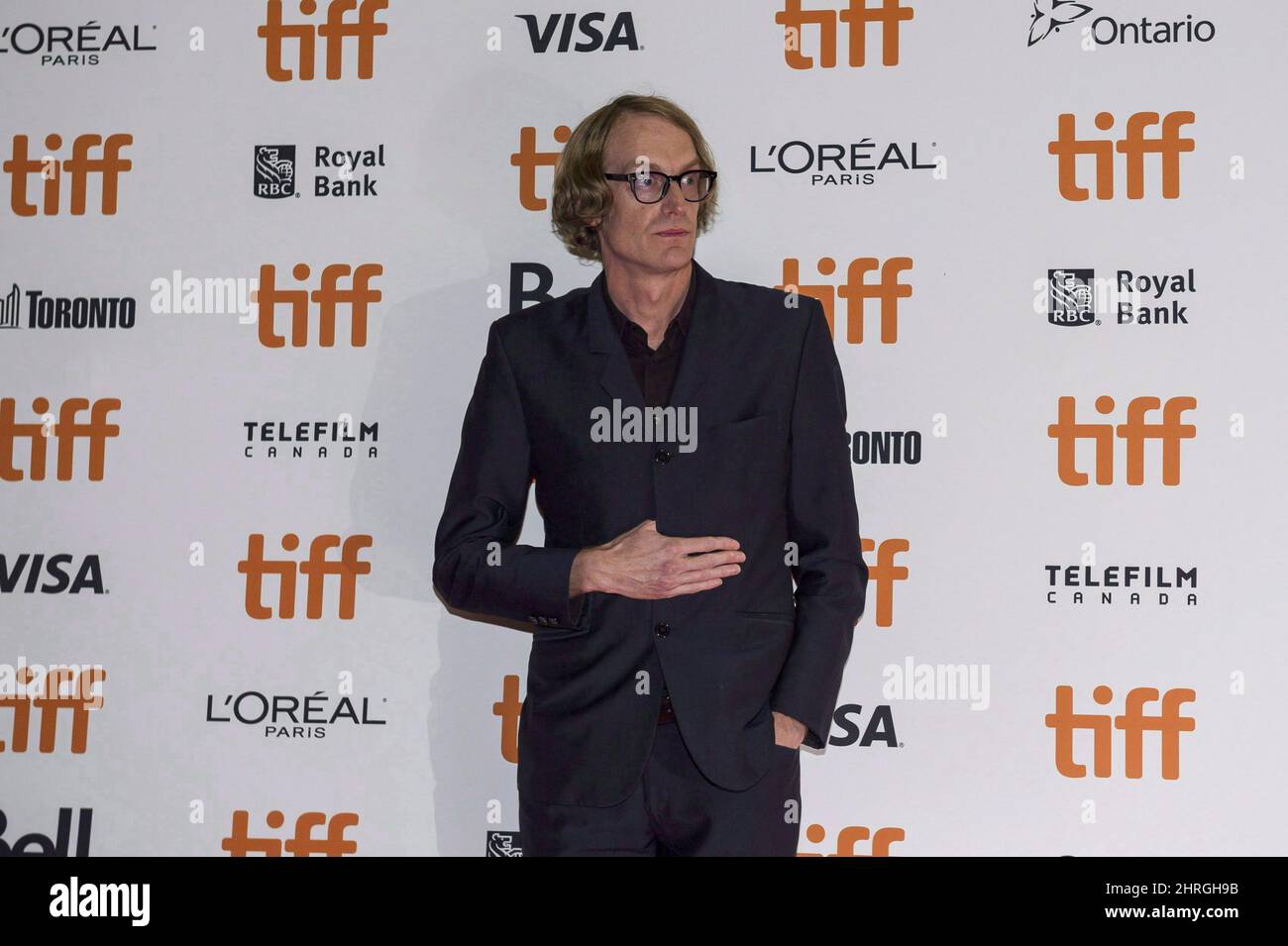 Author Patrick deWitt arrives ahead of the screening of "The Sisters ...