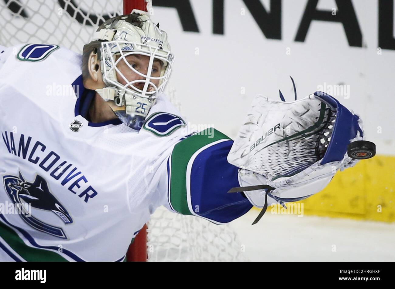 Vancouver Canucks goalie Jacob Markstrom, of Sweden, grabs for a lose ...