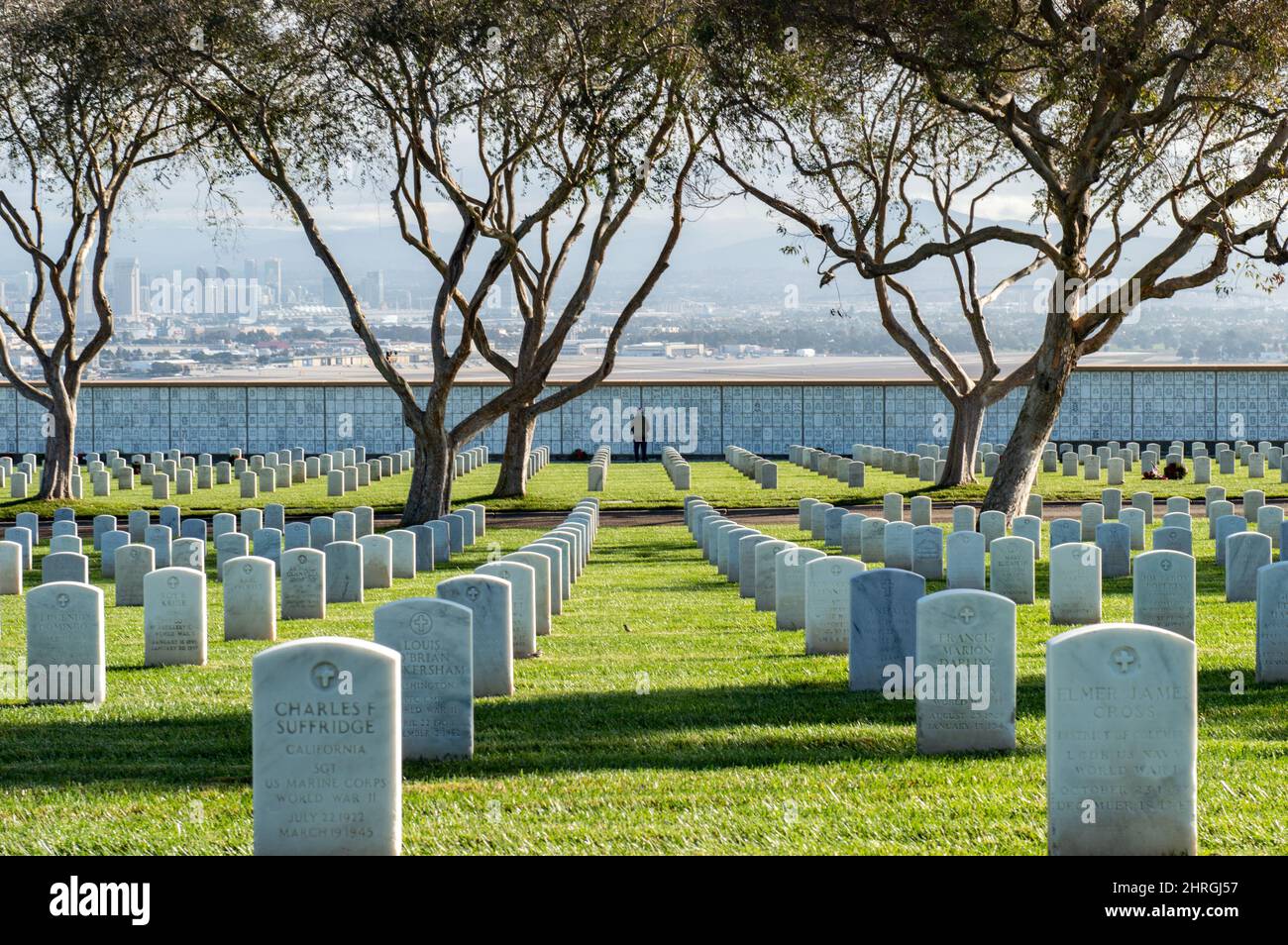Visitor pays respects at Fort Rosecrans National Cemetery at Point Loma ...