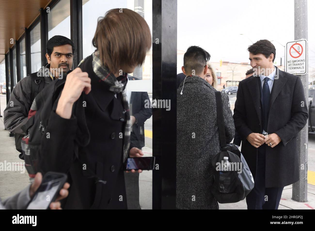Prime Minister Justin Trudeau greets commuters at the City Centre ...