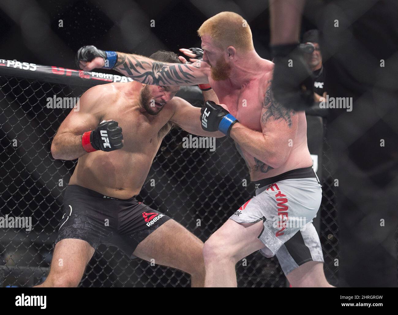 Gian Villante, left, battles Ed Herman in a light heavyweight bout ...