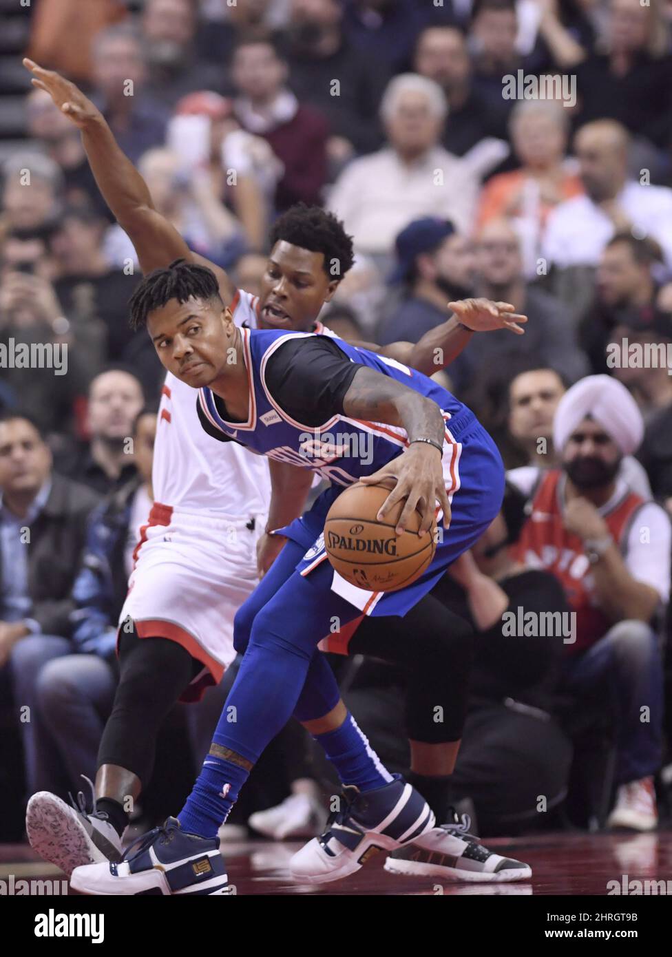 Philadelphia 76ers guard Markelle Fultz (20) is foul by Toronto Raptors ...