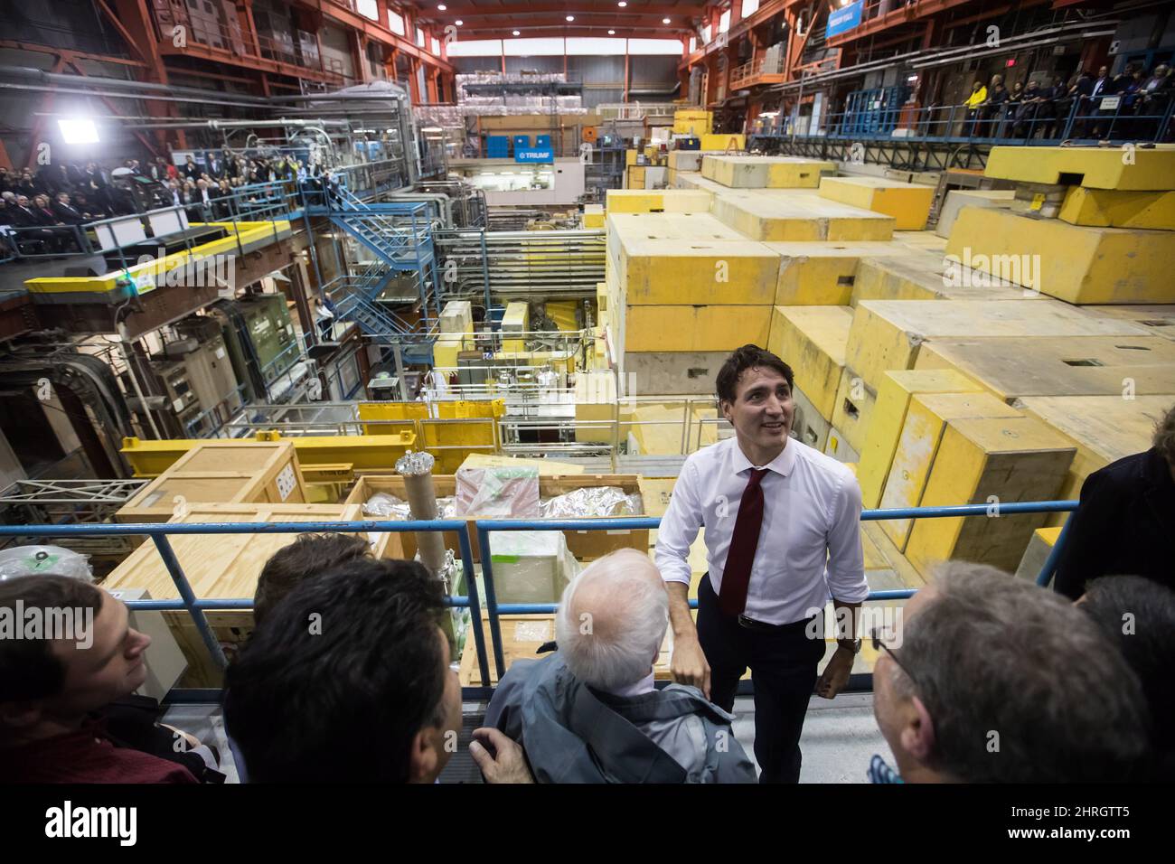 Prime Minister Justin Trudeau greets staff and students during a visit ...