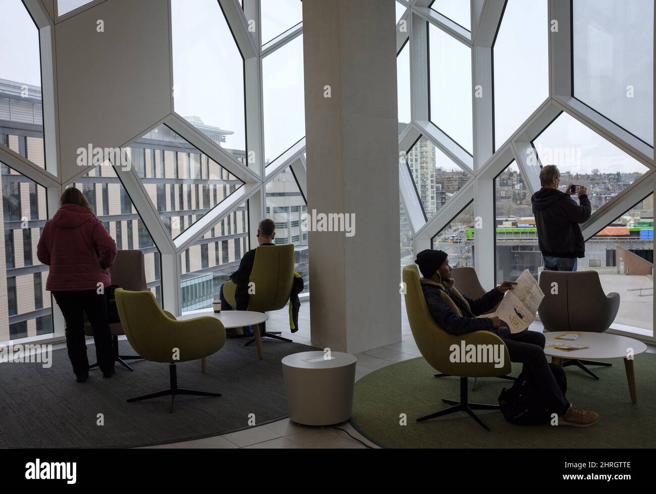 Visitors explore the new Calgary Library following its opening in ...