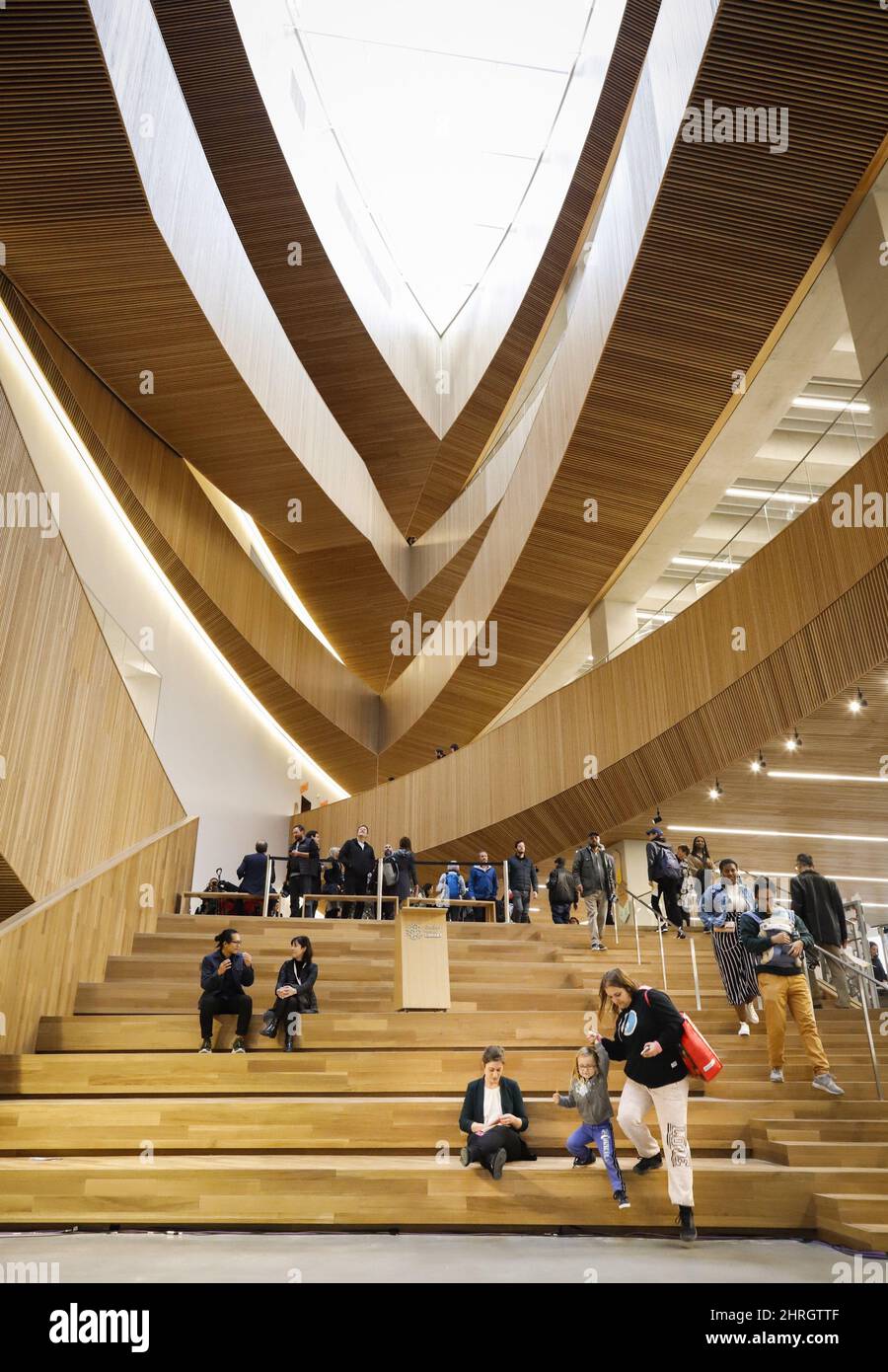 Visitors explore the new Calgary Library following its opening in ...