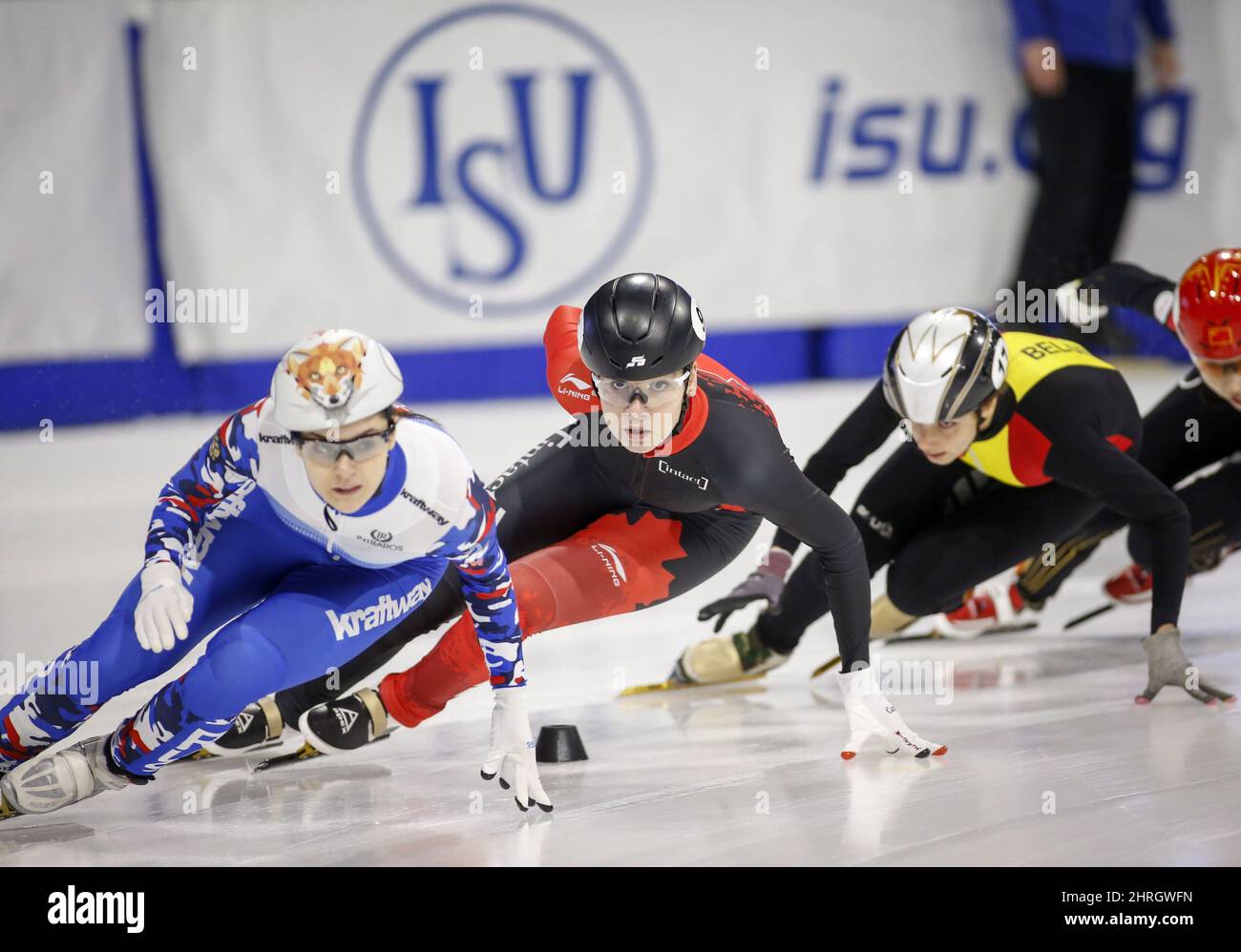 Canada's Courtney Lee Sarault, centre, skates with Russia's Sofia ...