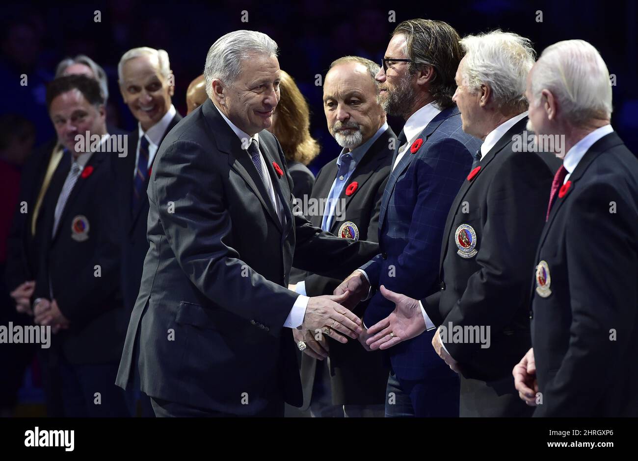 Hockey Hall of Fame inductee Alexander Yakushev shakes hands with HHoF ...