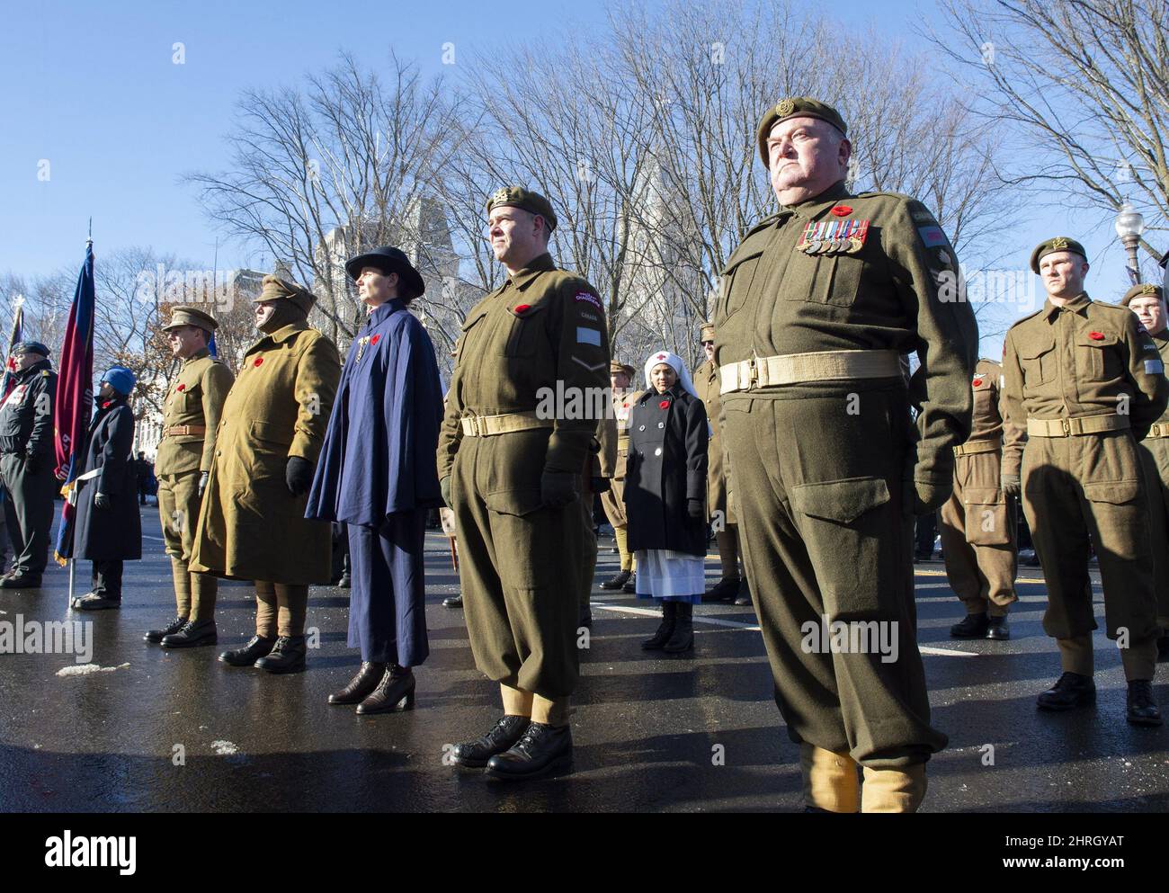 Army veterans dressed in historic First World War uniforms stand guard during a Remembrance Day ...