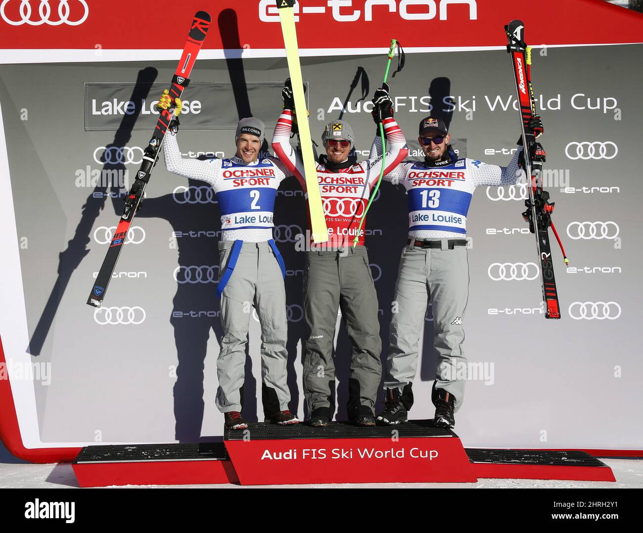 Austria's Max Franz, centre, celebrates his win on the podium with ...