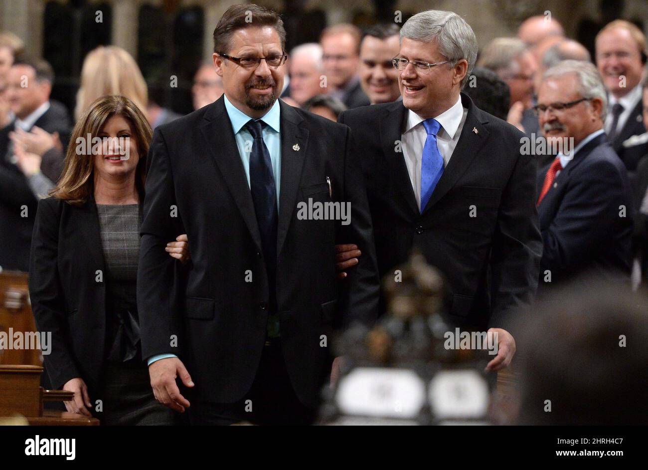 Prime Minister Stephen Harper and Health Minister Rona Ambrose escort ...