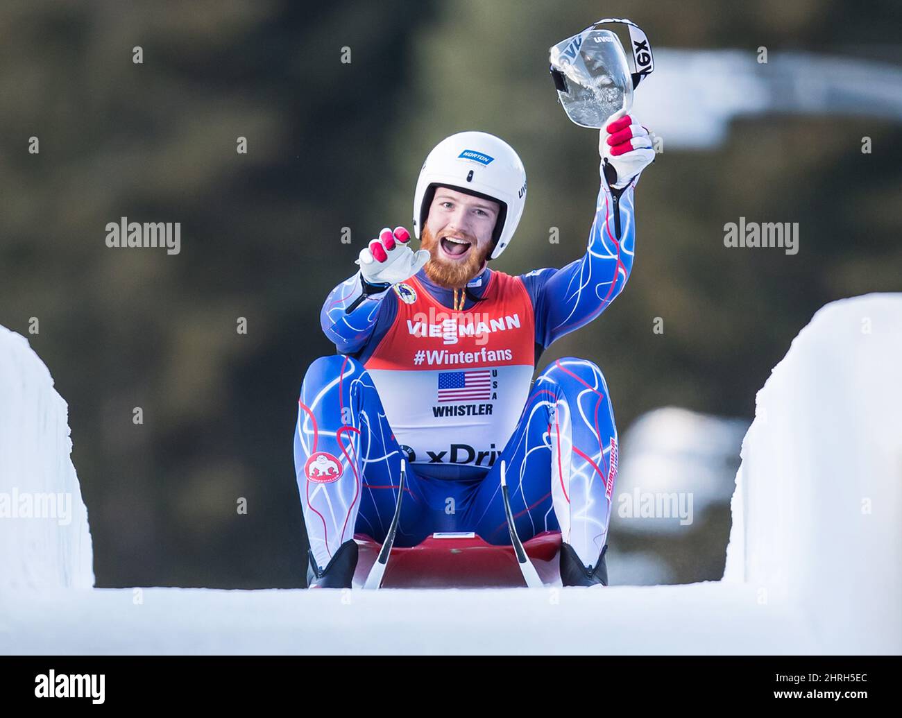 Jonny Gustafson, of the United States, reacts after racing the second ...