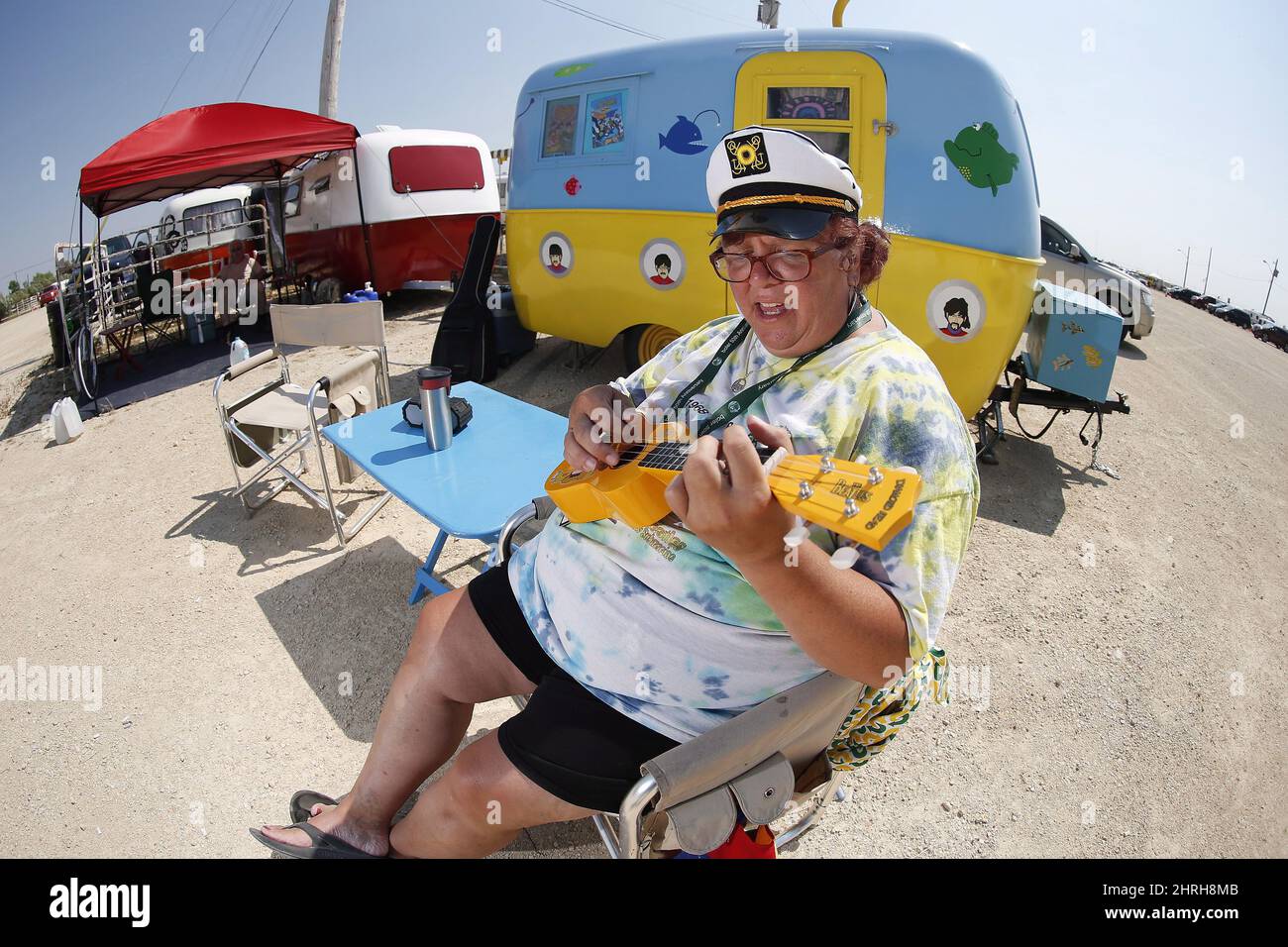 Angela Durand plays the ukulele outside her Yellow Submarine themed ...