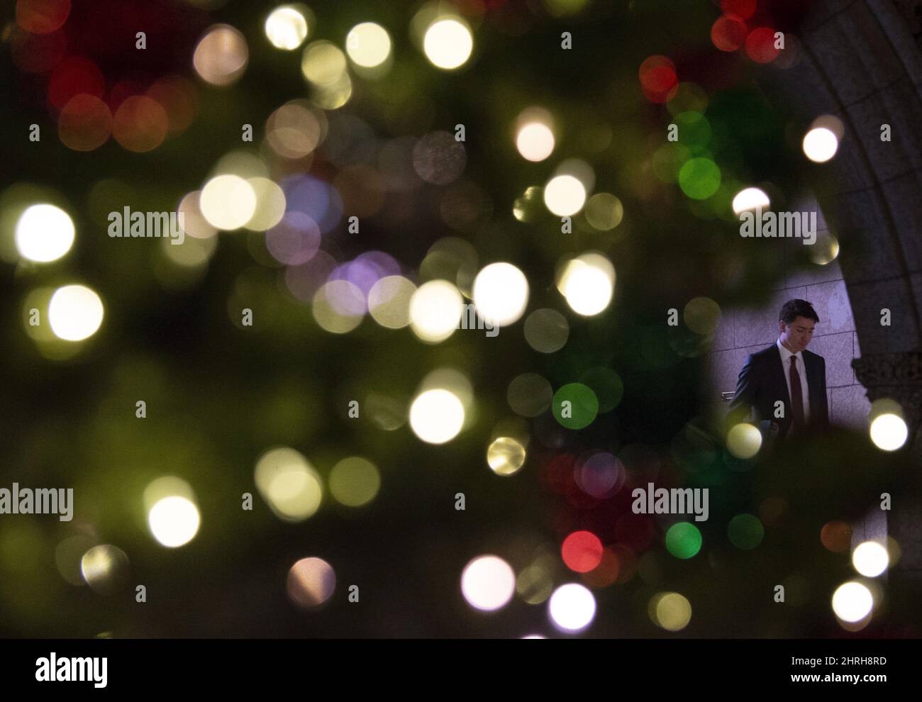 Prime Minister Justin Trudeau is framed by a Christmas tree in the ...
