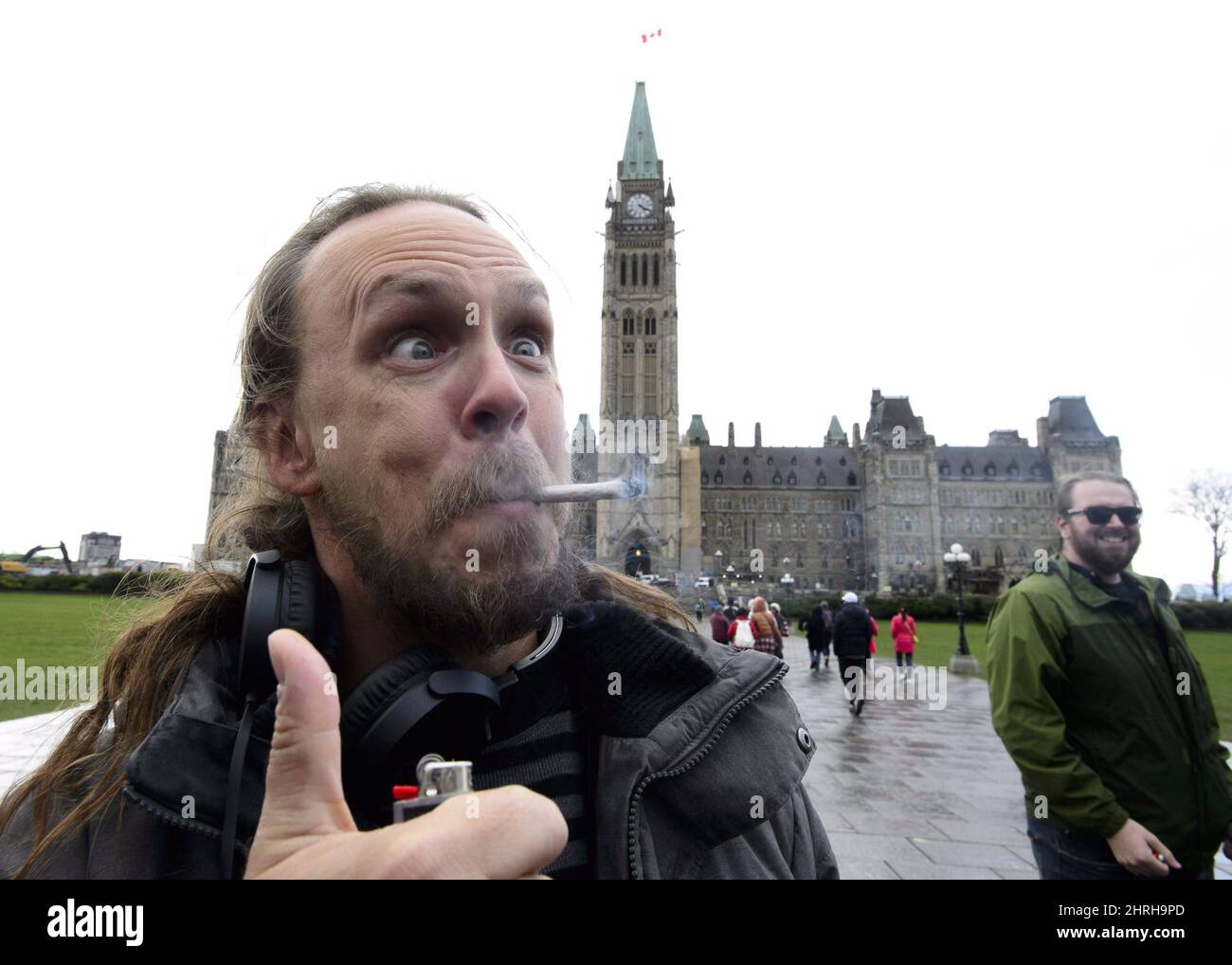 Denis Marcoux of Ottawa smokes a marijuana joint on Parliament Hill in ...