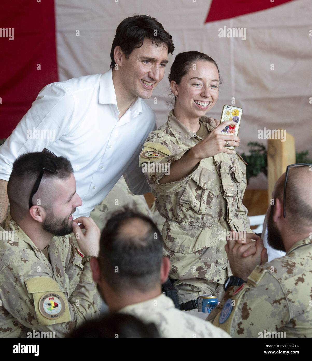 Canadian Prime Minister Justin Trudeau poses for a photo as he speaks ...