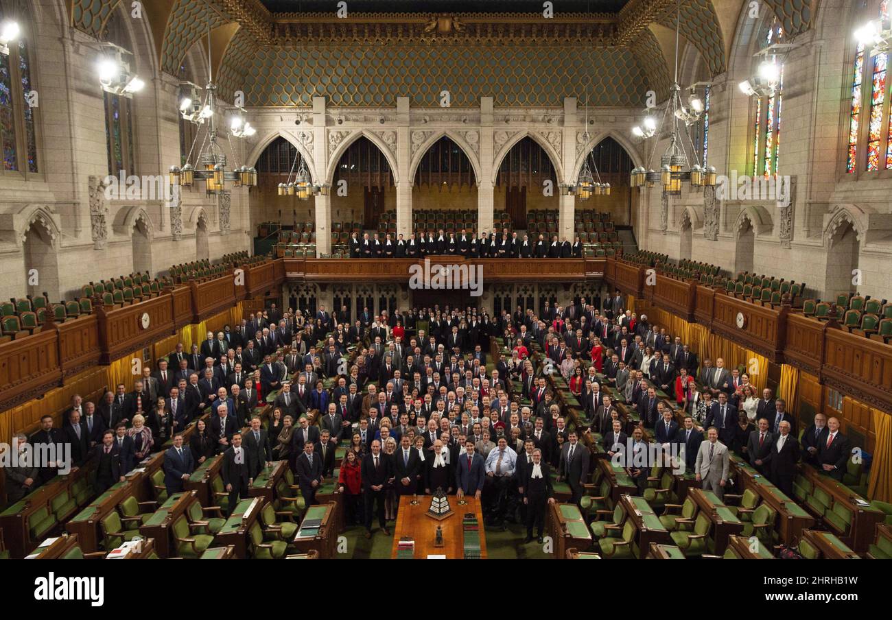 Members of the House of Commons pose for a photo in the chamber before ...