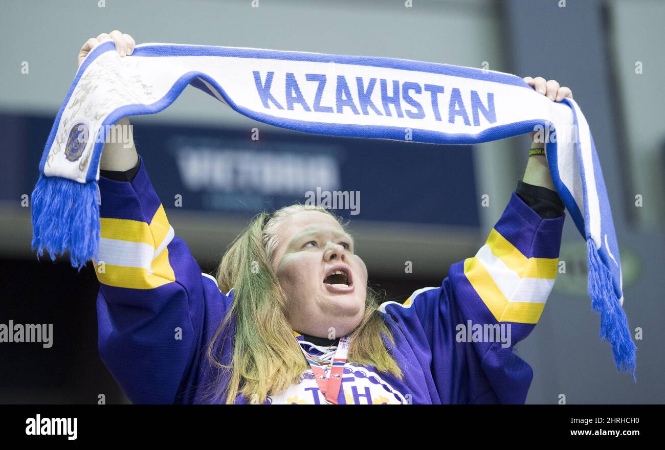 A Kazakhstan hockey fan cheers during first period IIHF world junior ...