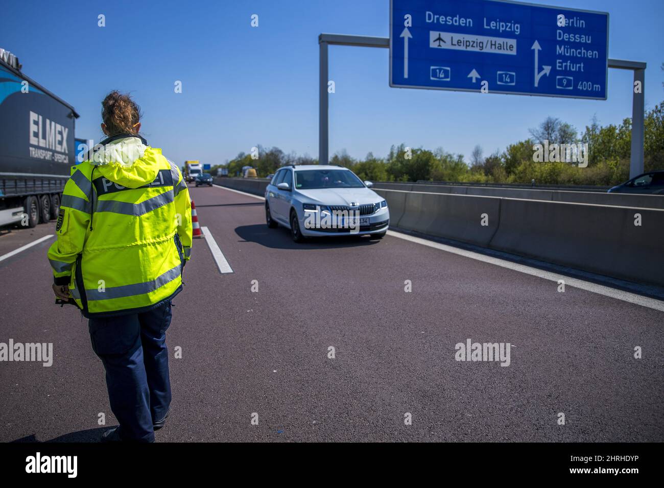 Police on the highway controling the process Stock Photo - Alamy