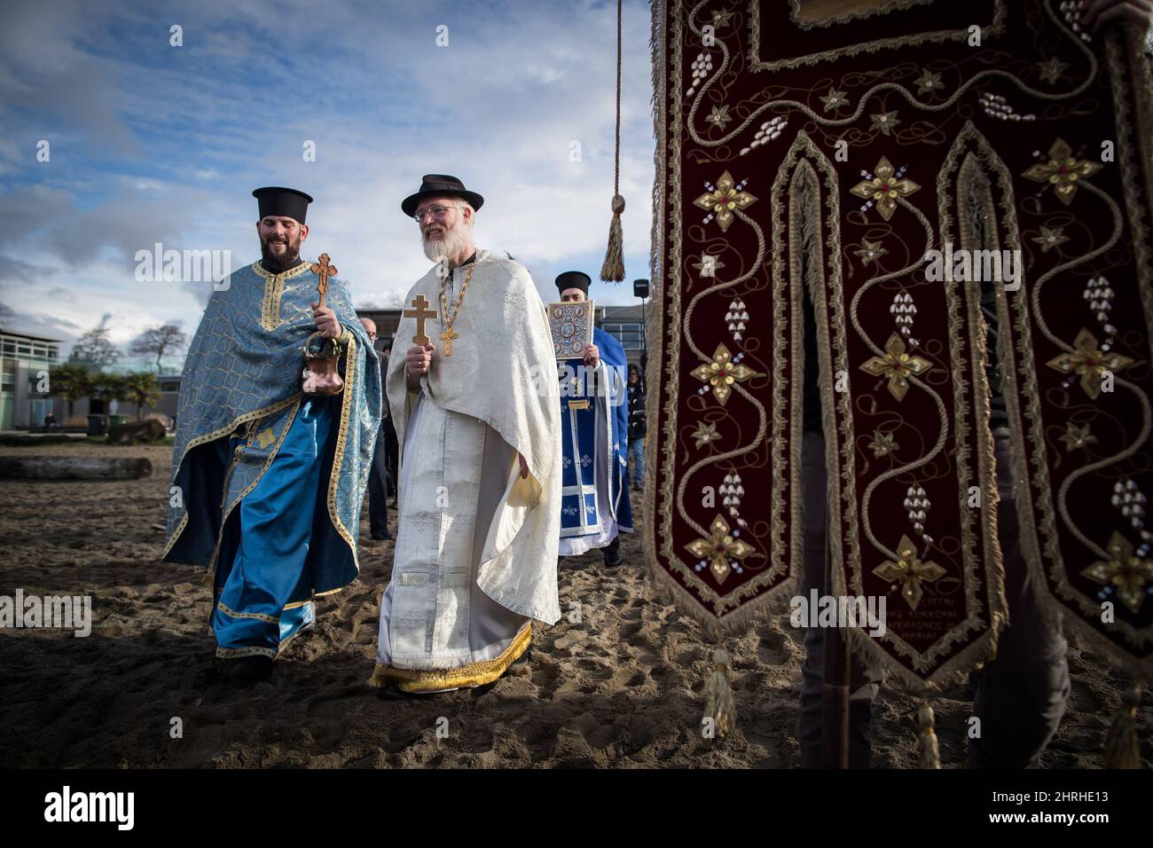 Father Constantinos Economos, left, and Father Justin Hewlett, walk ...