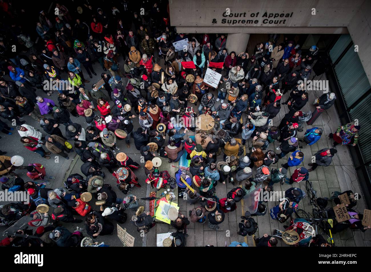 Protesters gather as First Nations drummers play during a rally before ...