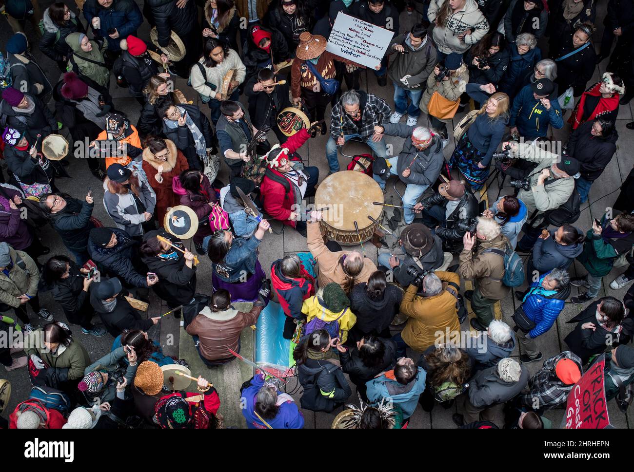 Protesters gather as First Nations drummers play during a rally before ...