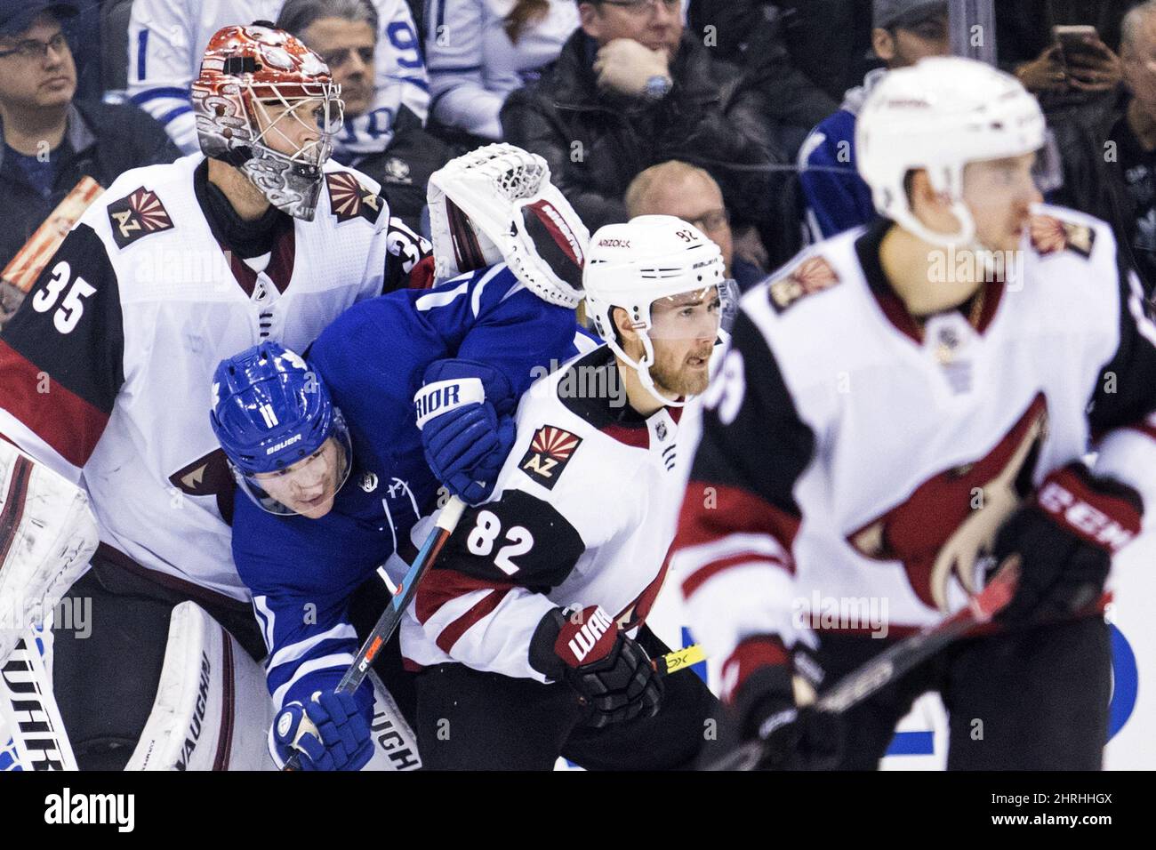 Toronto Maple Leafs' Zach Hyman battles between Arizona Coyotes ...