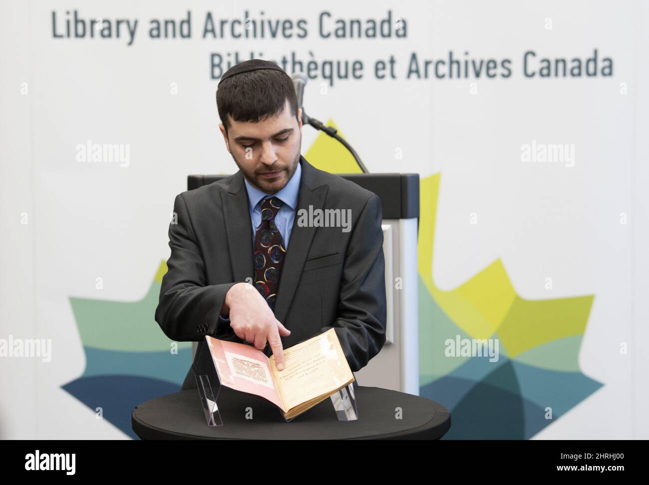 Michael Kent, curator of the Jacob M. Lowy collection, displays the ...