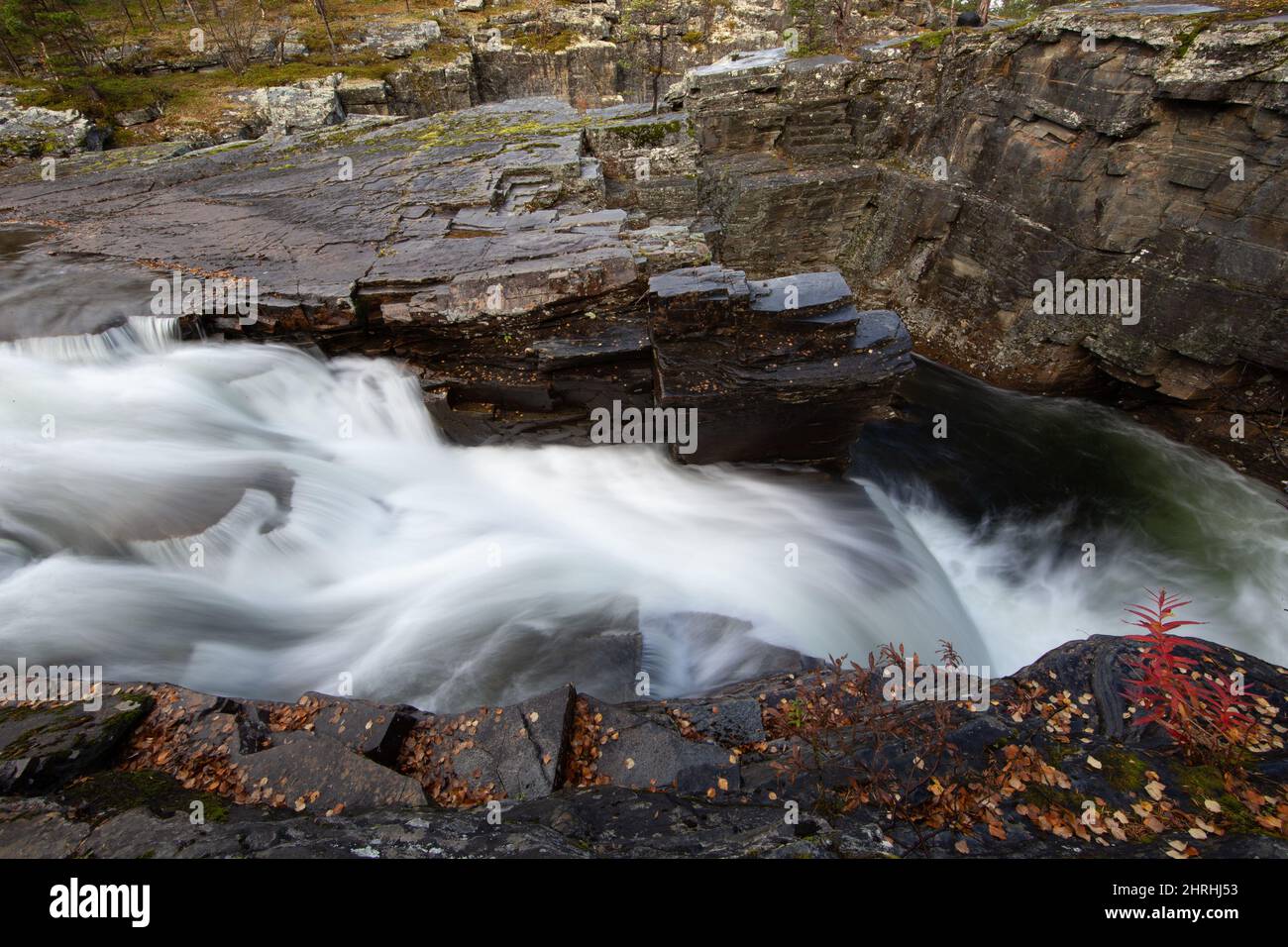 Beautiful river flowing between rocks Stock Photo - Alamy