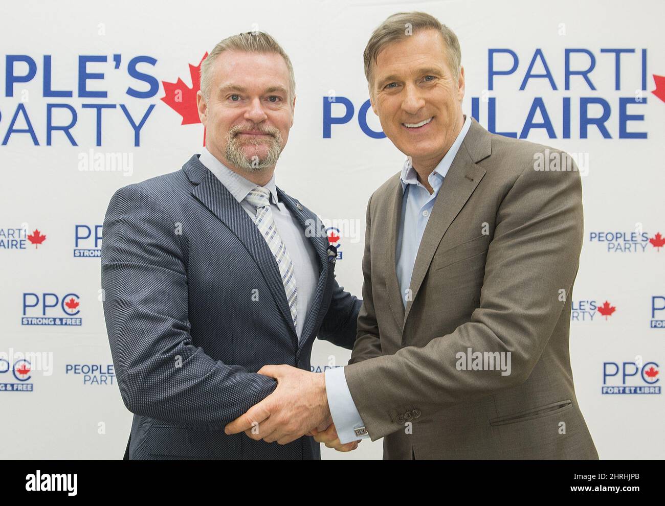 People's Party of Canada leader Maxime Bernier, right, poses with James Seale, a candidate for ...